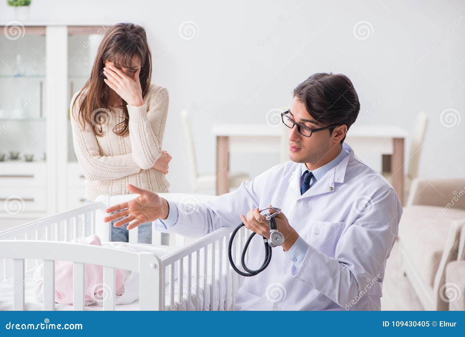 The Doctor Explaining To Young Mother Stock Image - Image of clinic ...