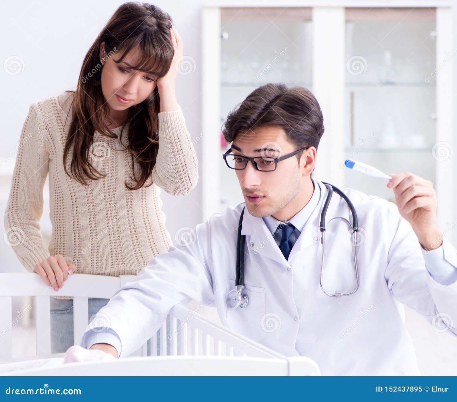 Doctor Explaining To Young Mother Stock Image - Image of explaining ...