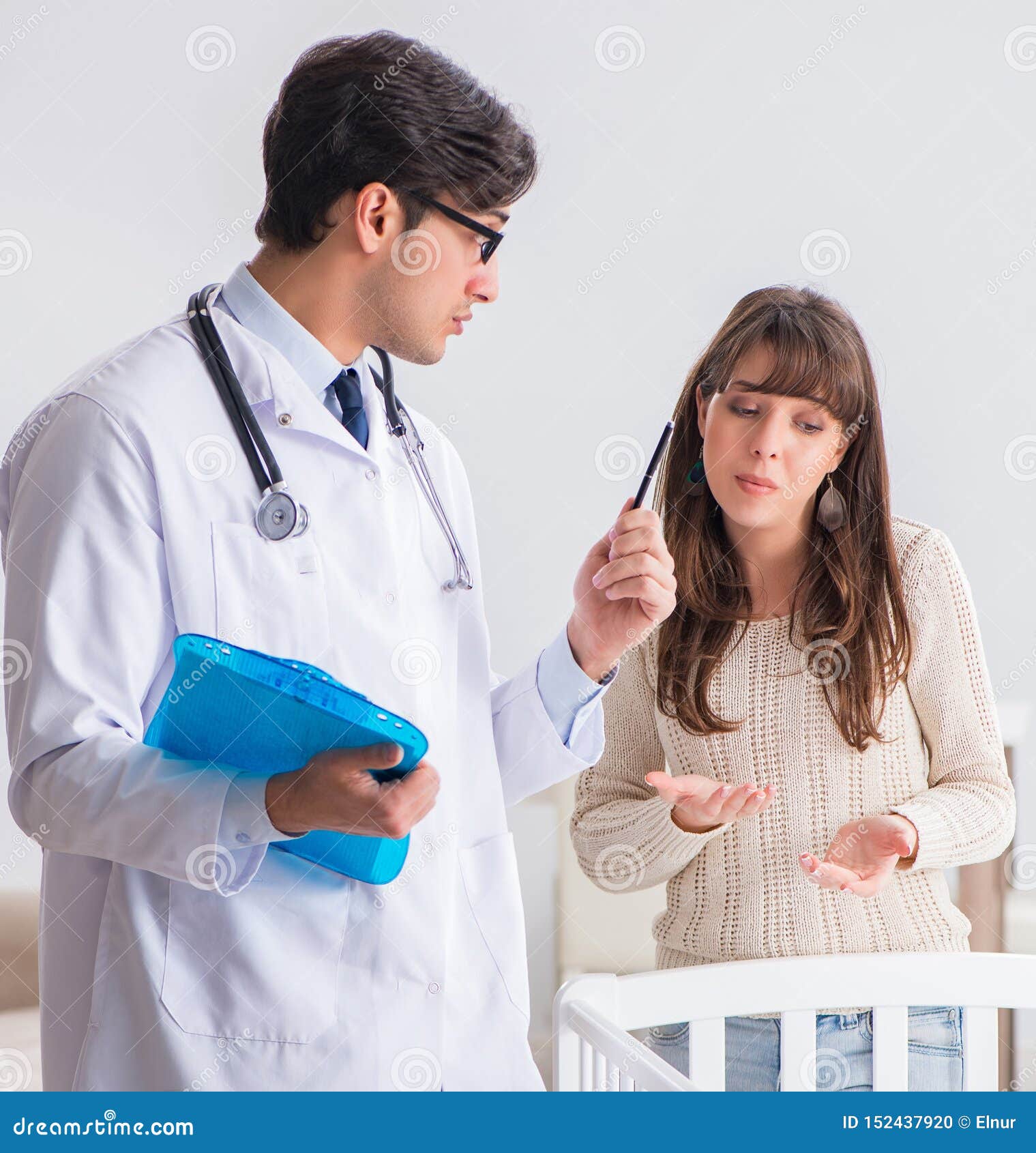 Doctor Explaining To Young Mother Stock Photo - Image of patient, fever ...