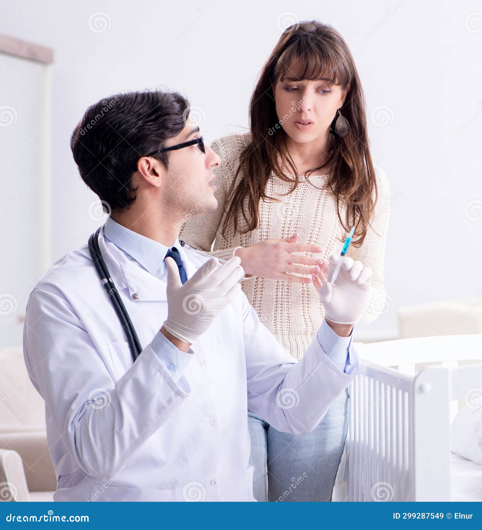 Doctor Explaining To Young Mother Stock Image - Image of health, baby ...