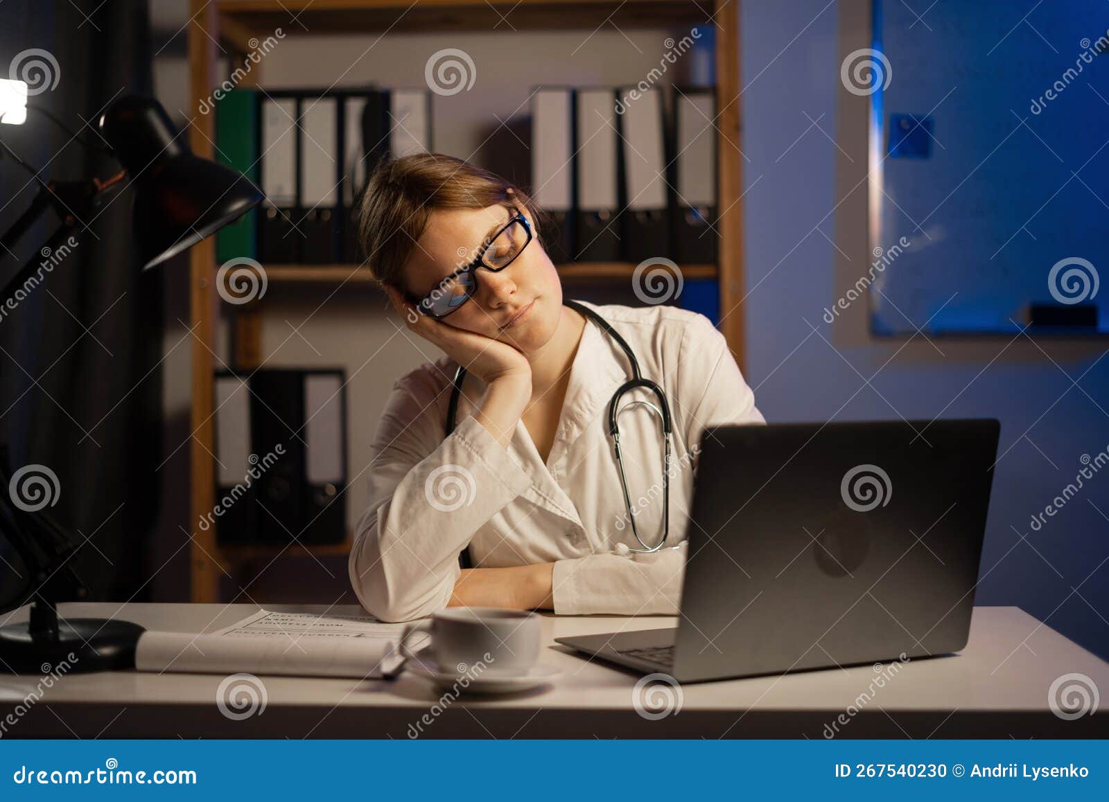 Doctor Falling Asleep at Medical Office after Hours, Working Late at ...