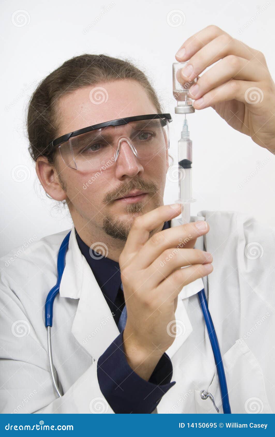 Doctor filling syringe stock image. Image of syringe - 14150695