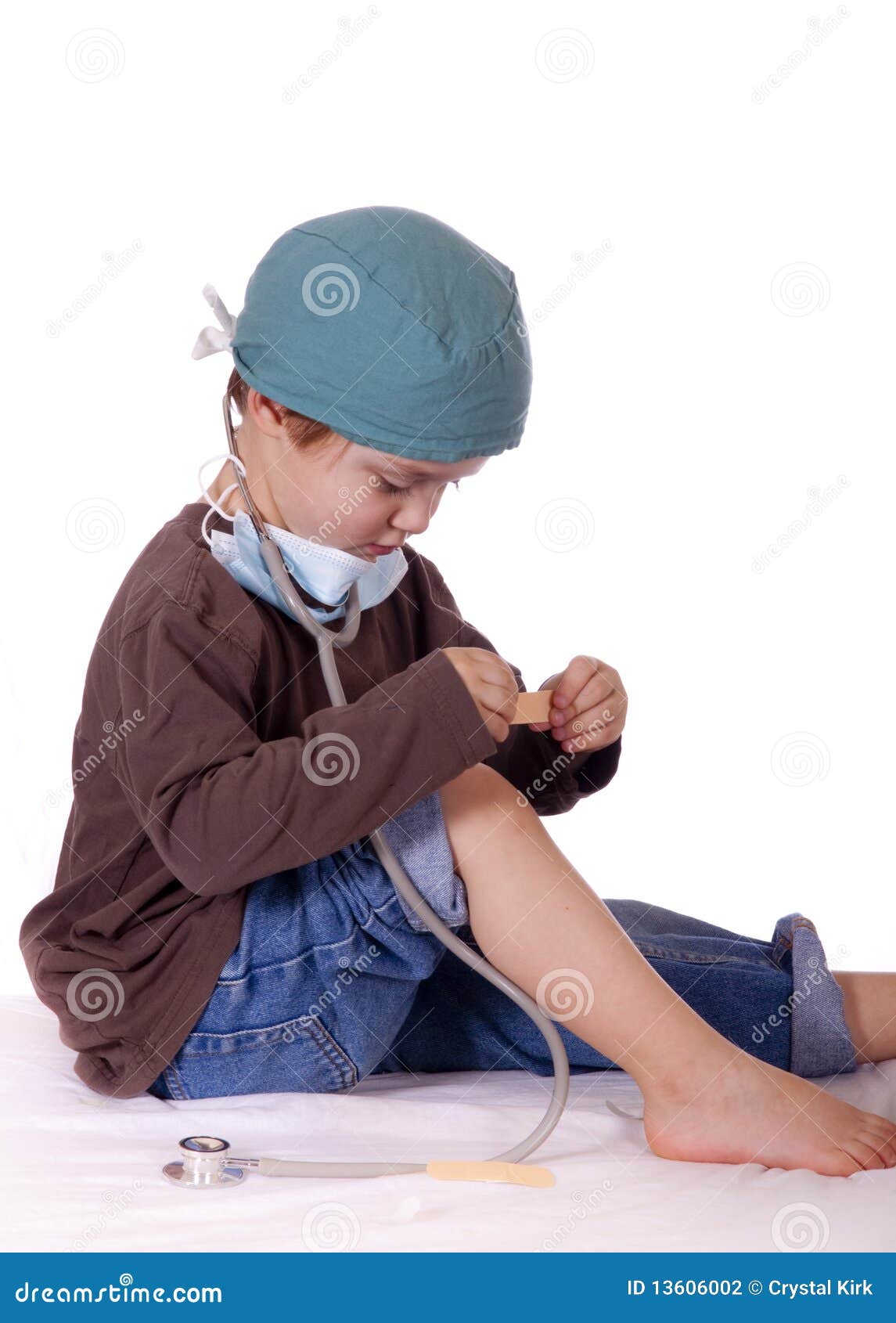 Doctor fixing his knee stock photo. Image of child, nurse - 13606002