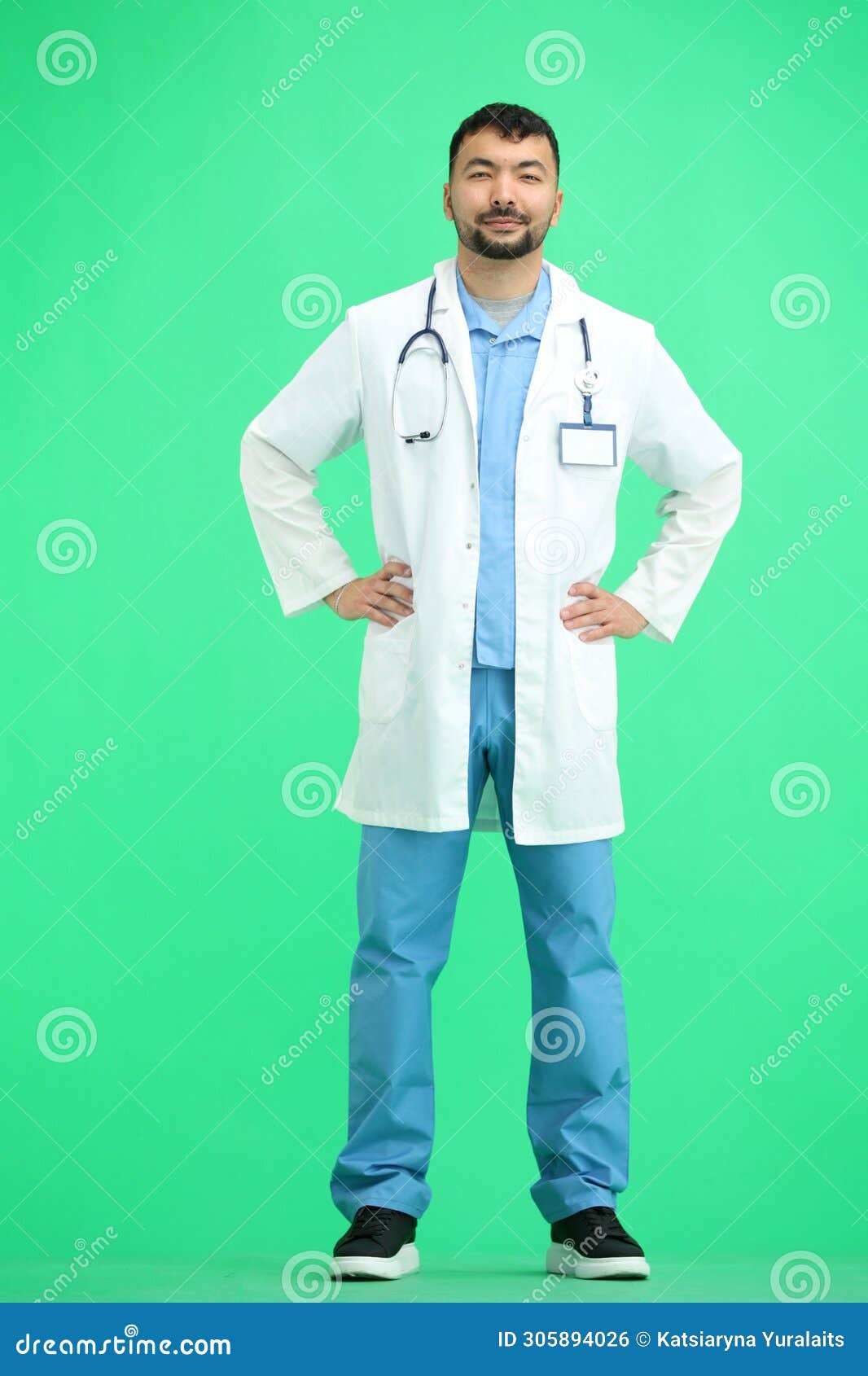 Doctor, Full-length, on a Green Background, Hands on Hips Stock Photo ...