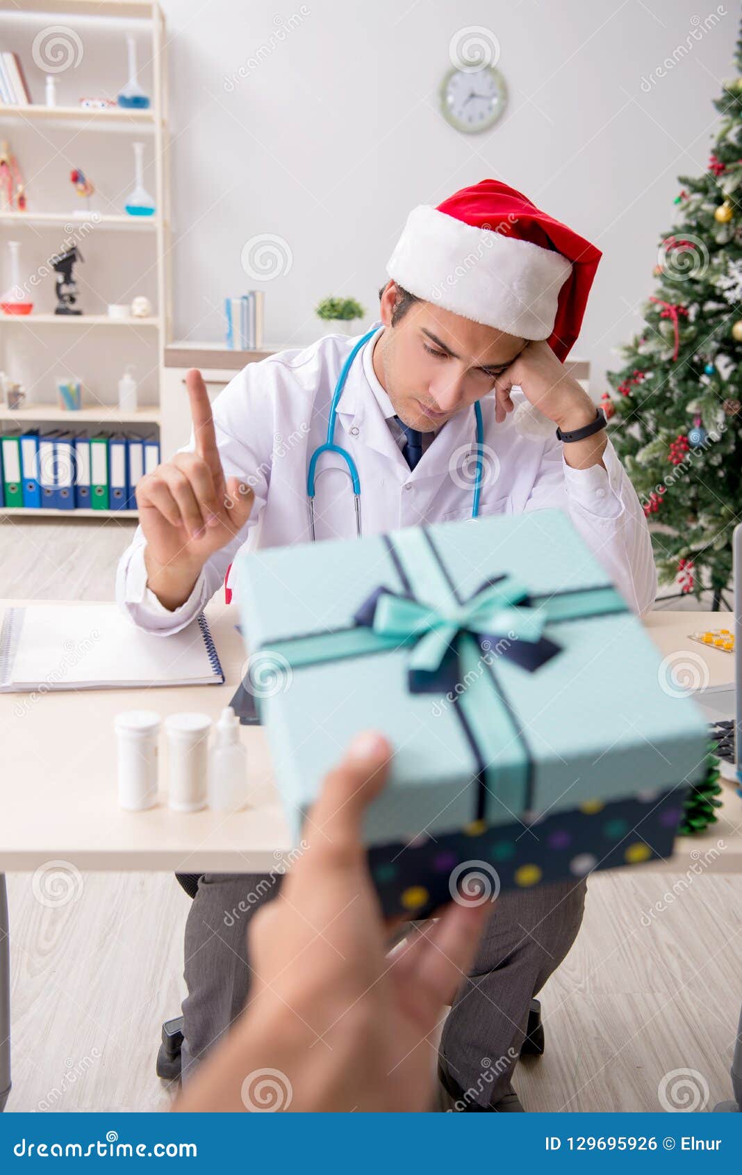 The Doctor with Gift Box in the Hospital Stock Photo - Image of ...