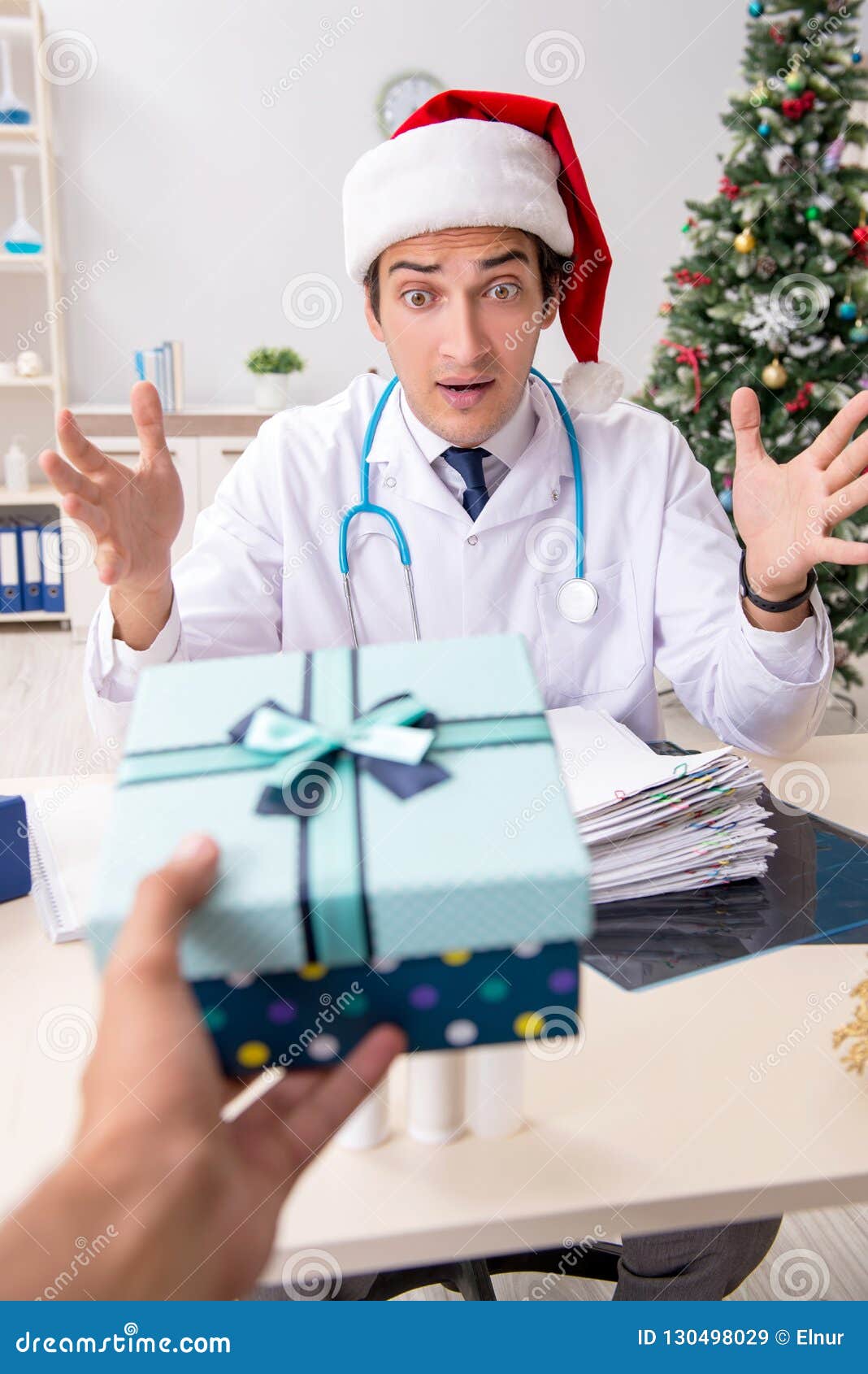The Doctor with Gift Box in the Hospital Stock Image - Image of ...