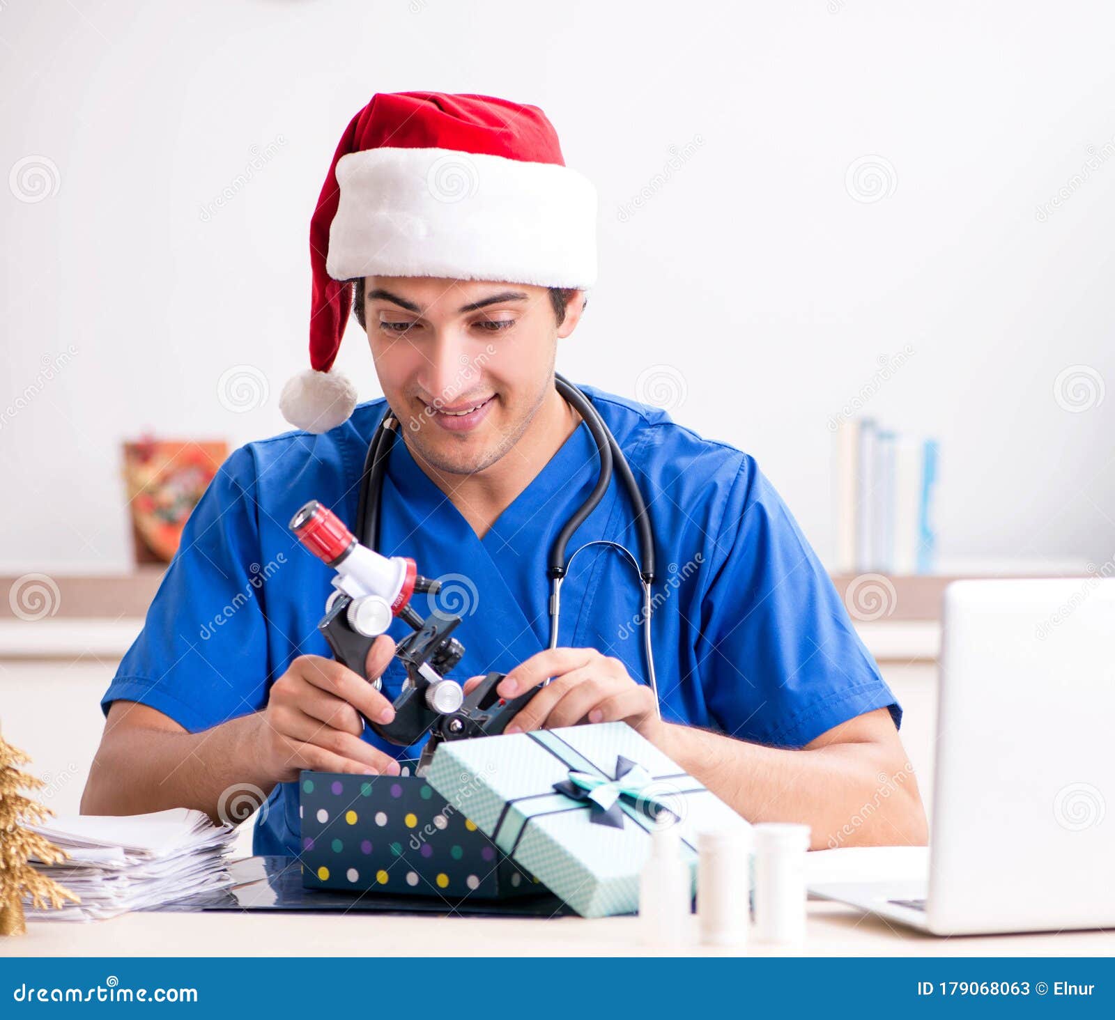 Doctor with Gift Box in the Hospital Stock Image - Image of exchanging ...