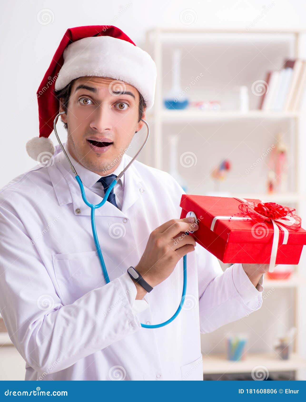 Doctor with Gift Box in the Hospital Stock Photo - Image of celebration ...