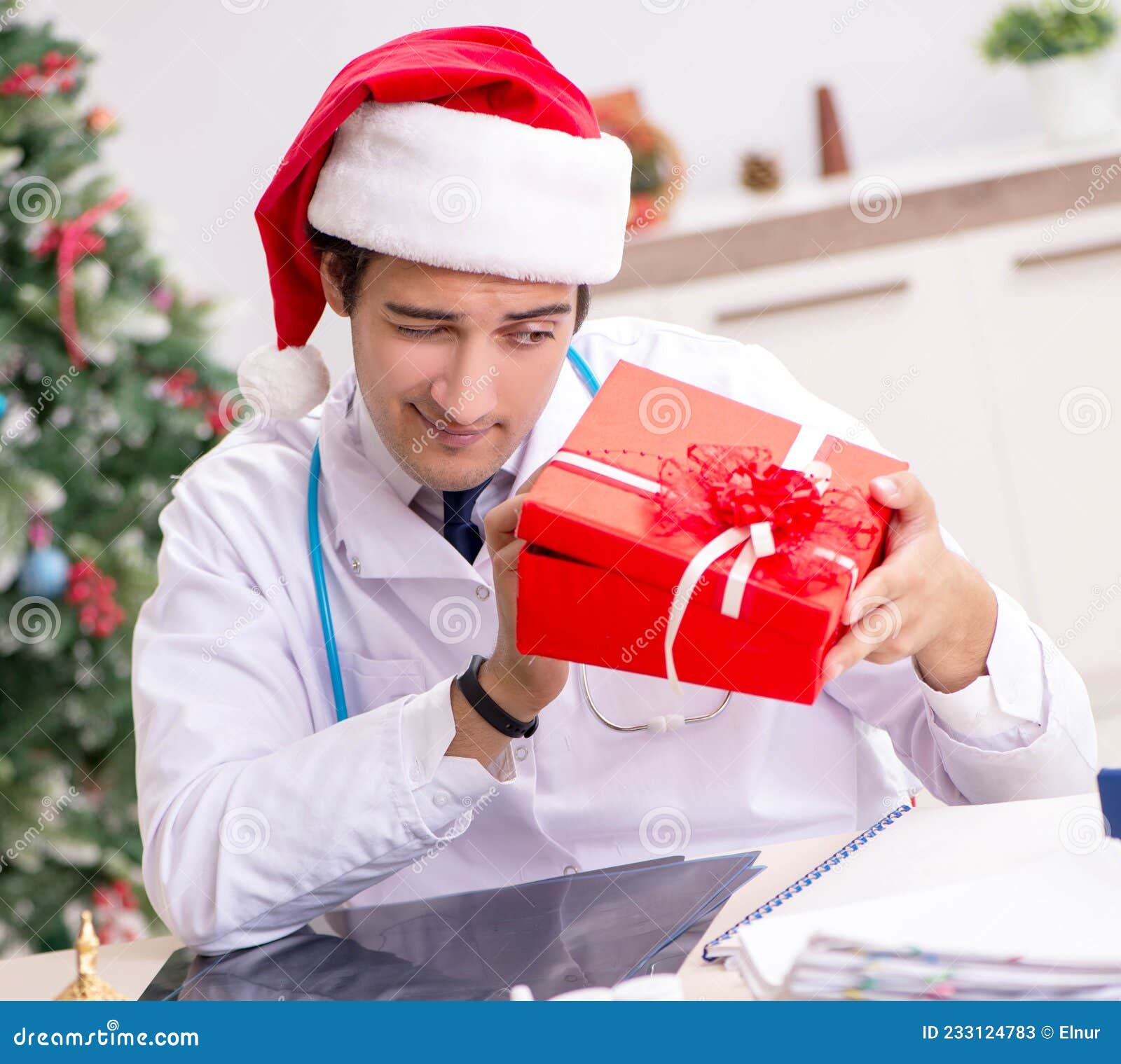 Doctor with Gift Box in the Hospital Stock Image - Image of medical ...