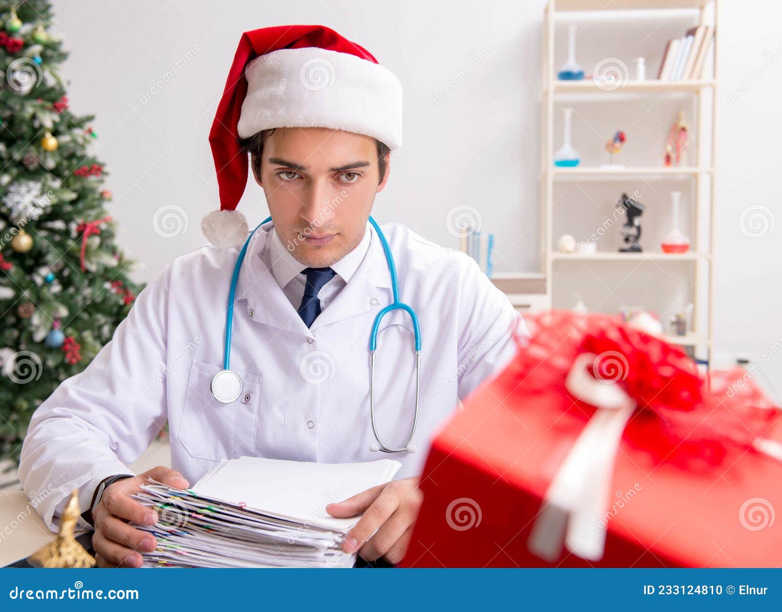 Doctor with Gift Box in the Hospital Stock Photo - Image of clinic ...