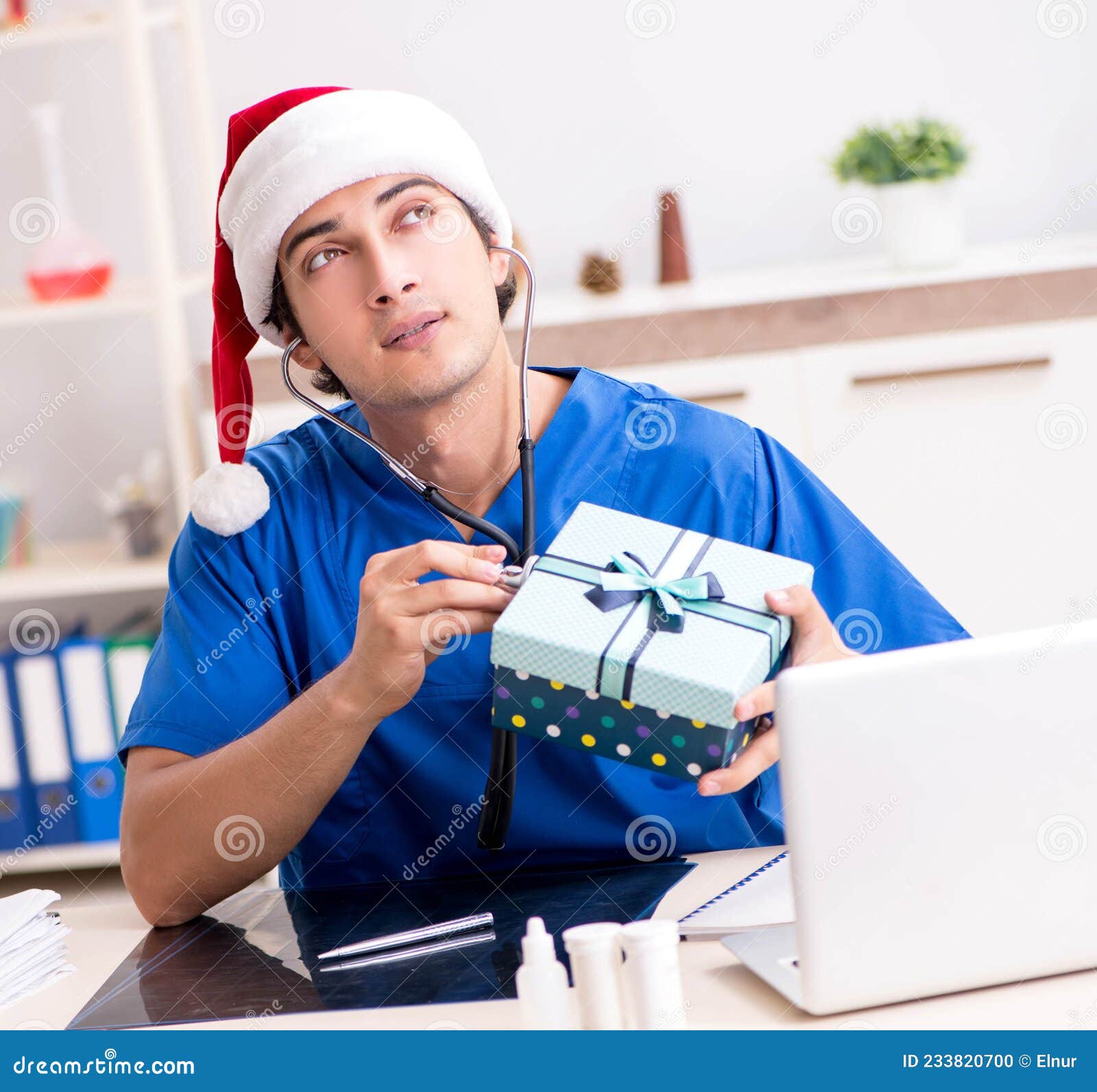 Doctor with Gift Box in the Hospital Stock Photo - Image of physician ...