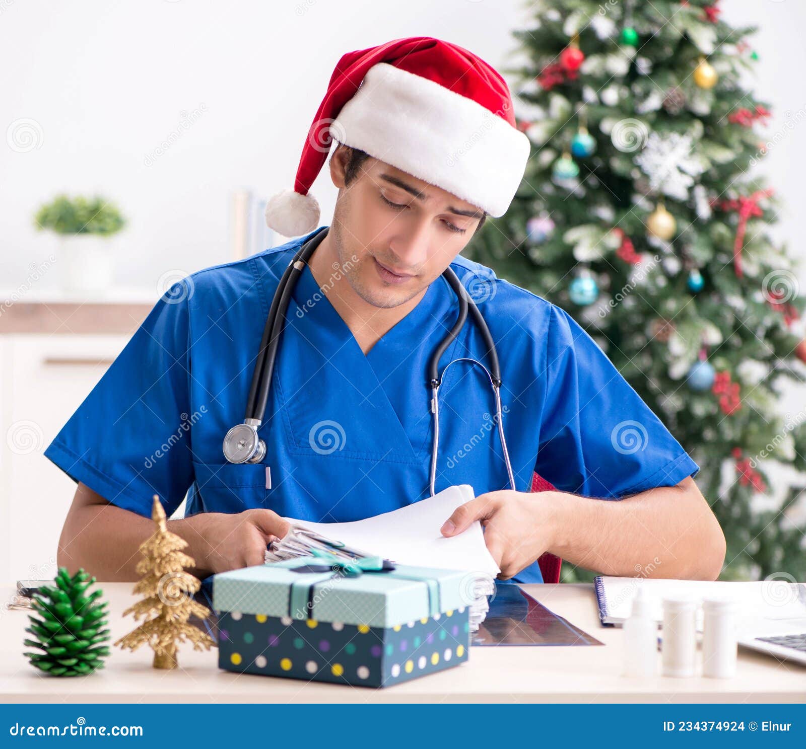 Doctor with Gift Box in the Hospital Stock Photo - Image of clinic ...