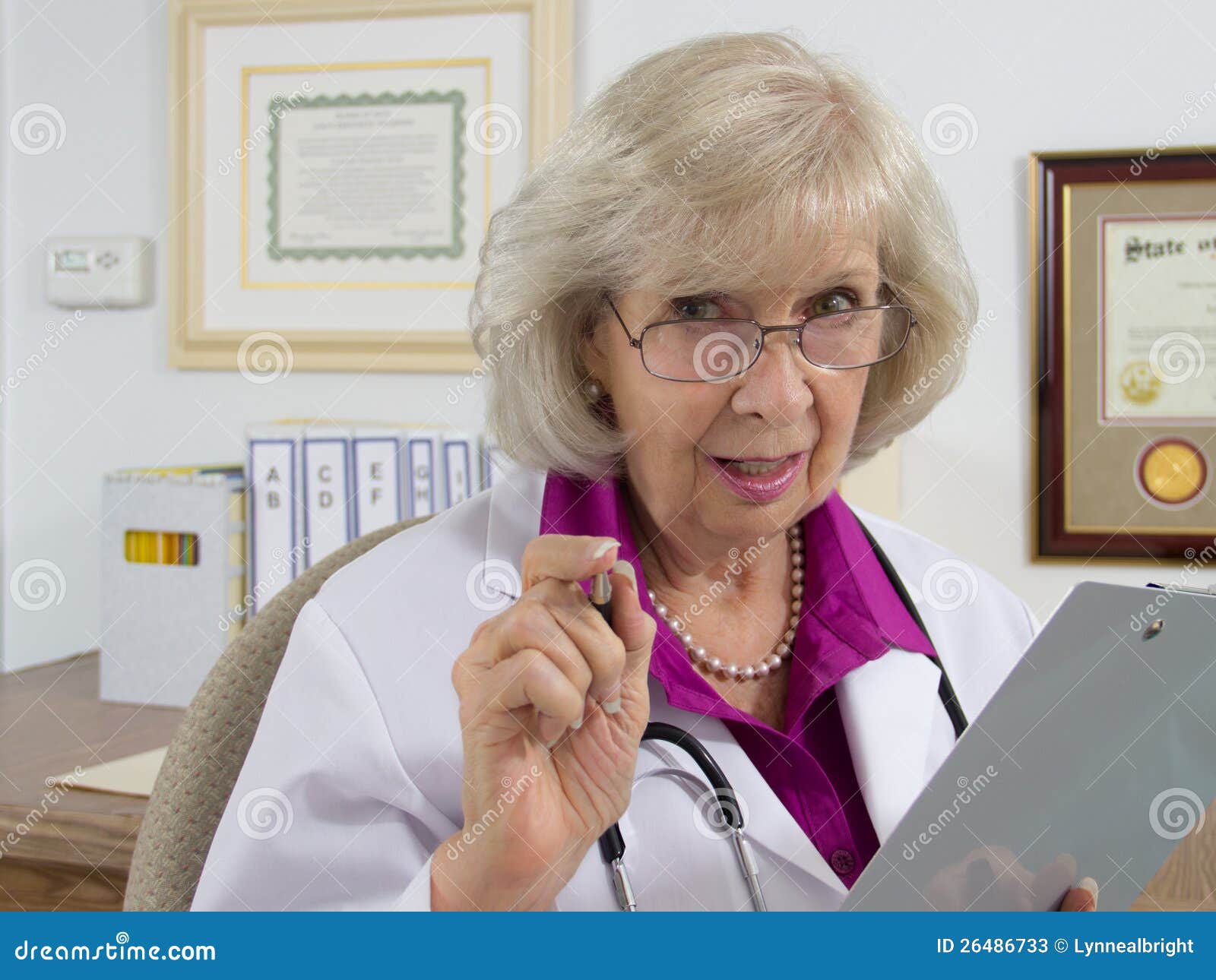 Doctor Giving Advice stock image. Image of seriousdoctor - 26486733