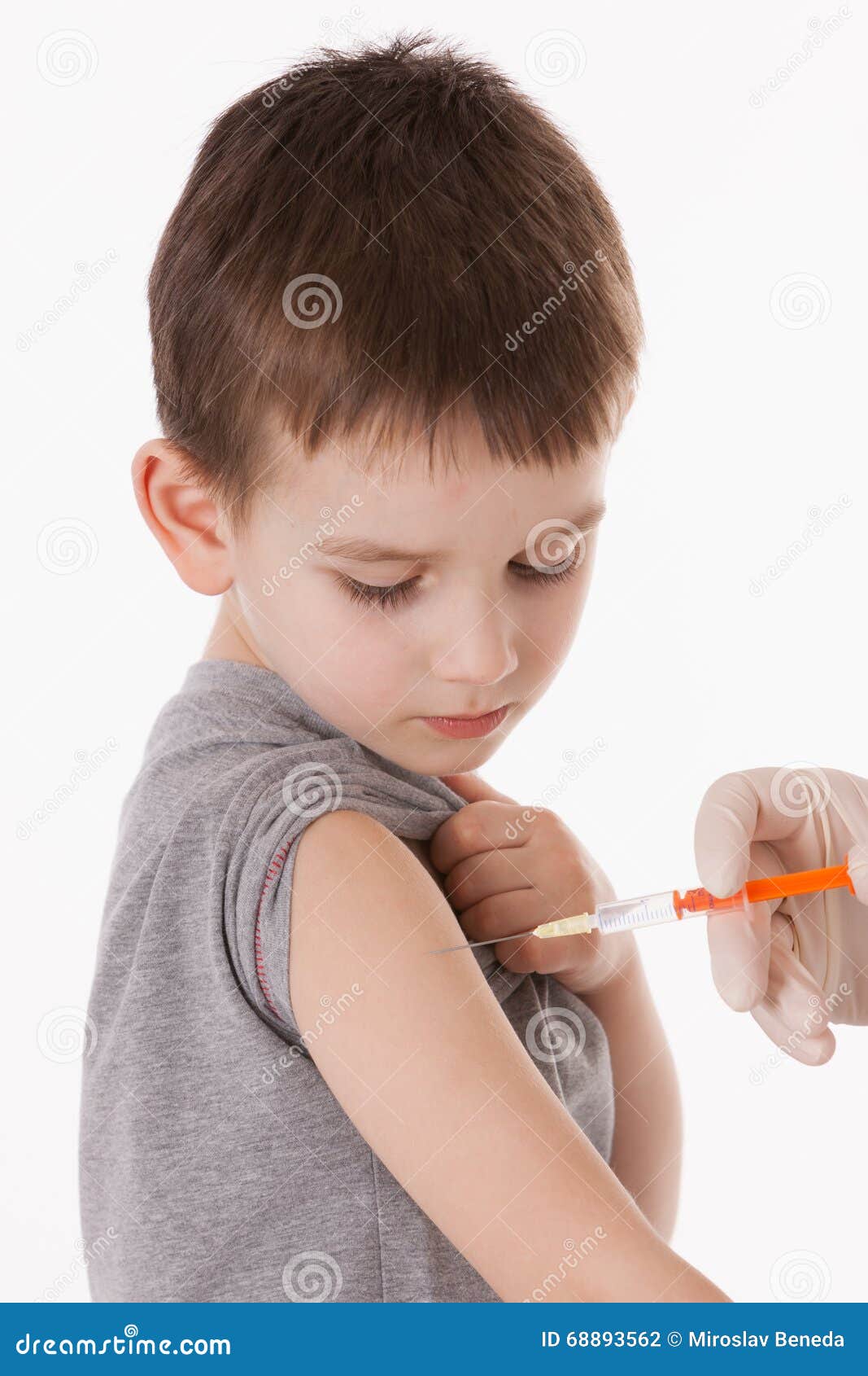 Doctor Giving a Child Injection in Arm Stock Photo - Image of caucasian ...