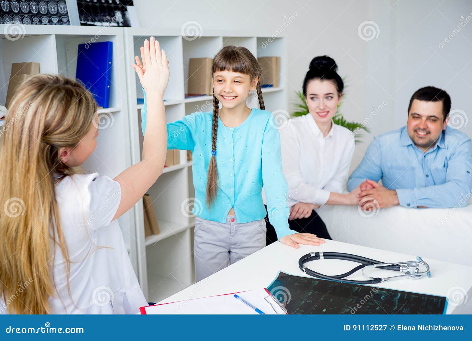 Doctor Giving Girl High-five Stock Image - Image of clinic, care: 91112527