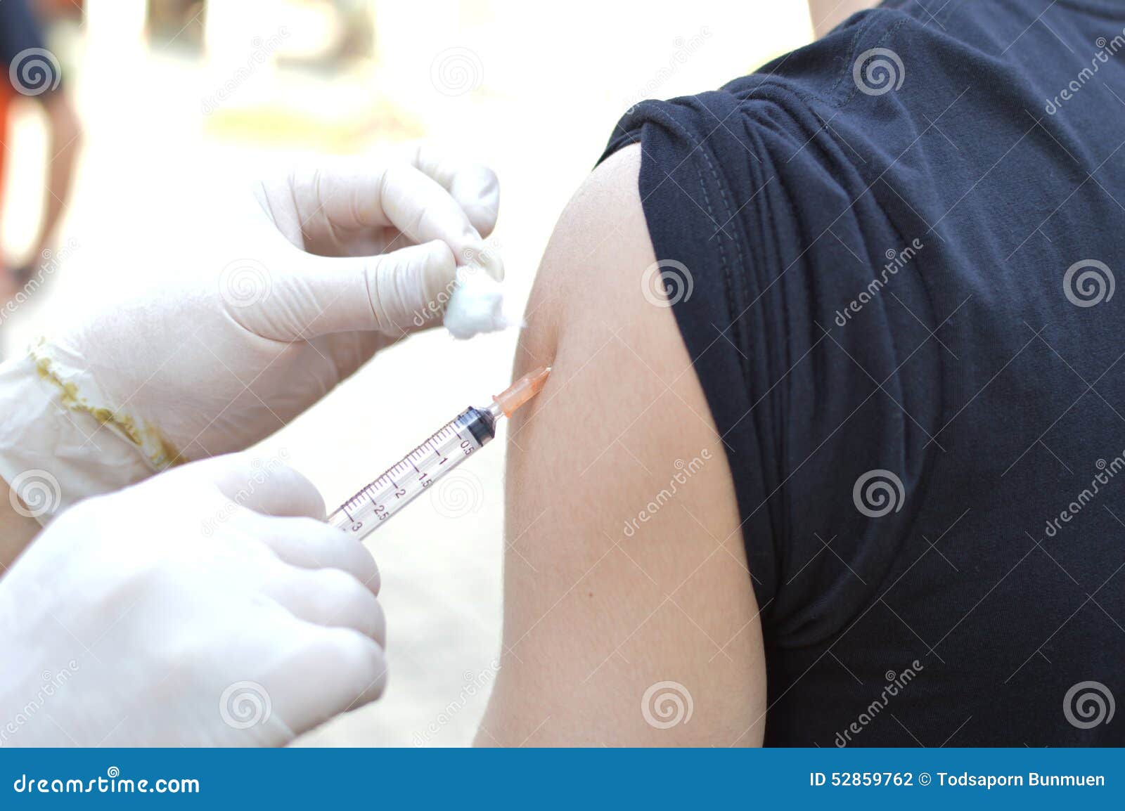 Doctor Giving an Injection To a Patient Stock Photo - Image of business ...