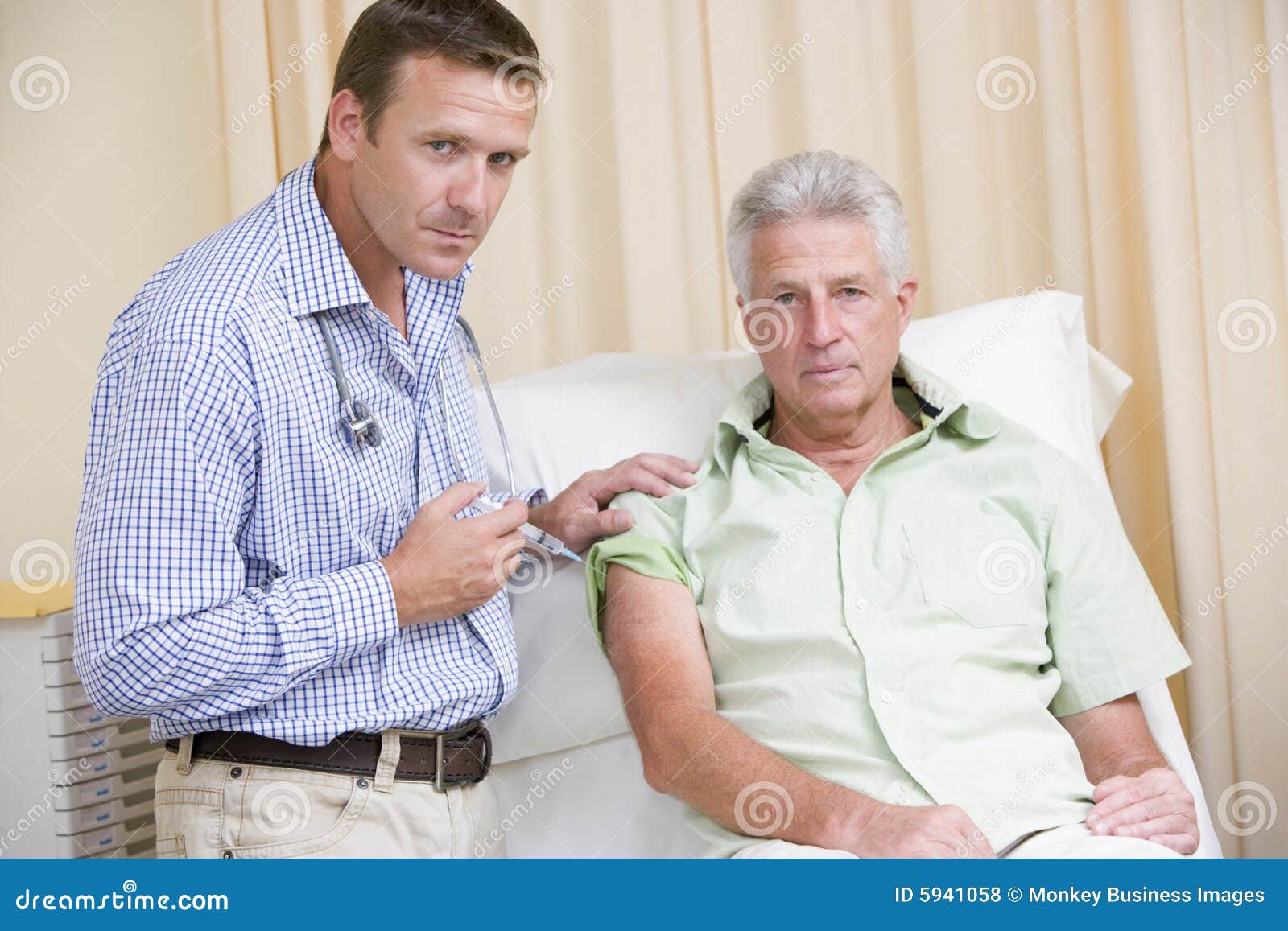 Doctor Giving Man Needle in Exam Room Stock Photo - Image of injection ...