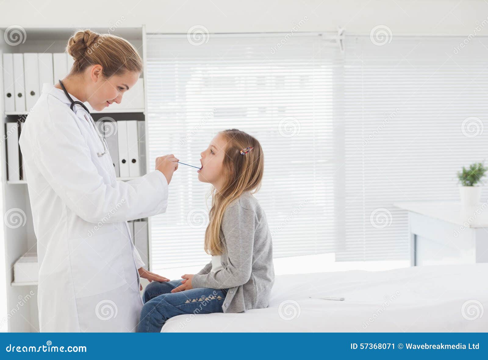 Doctor Giving Patient a Check Up Stock Image - Image of examination ...
