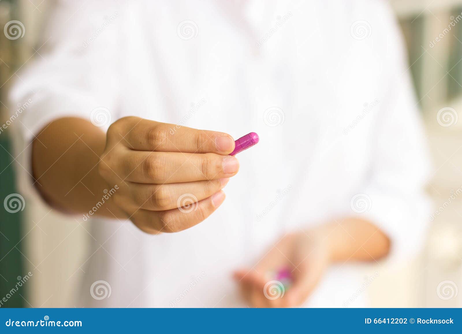 Doctor giving a pill stock photo. Image of care, concept - 66412202