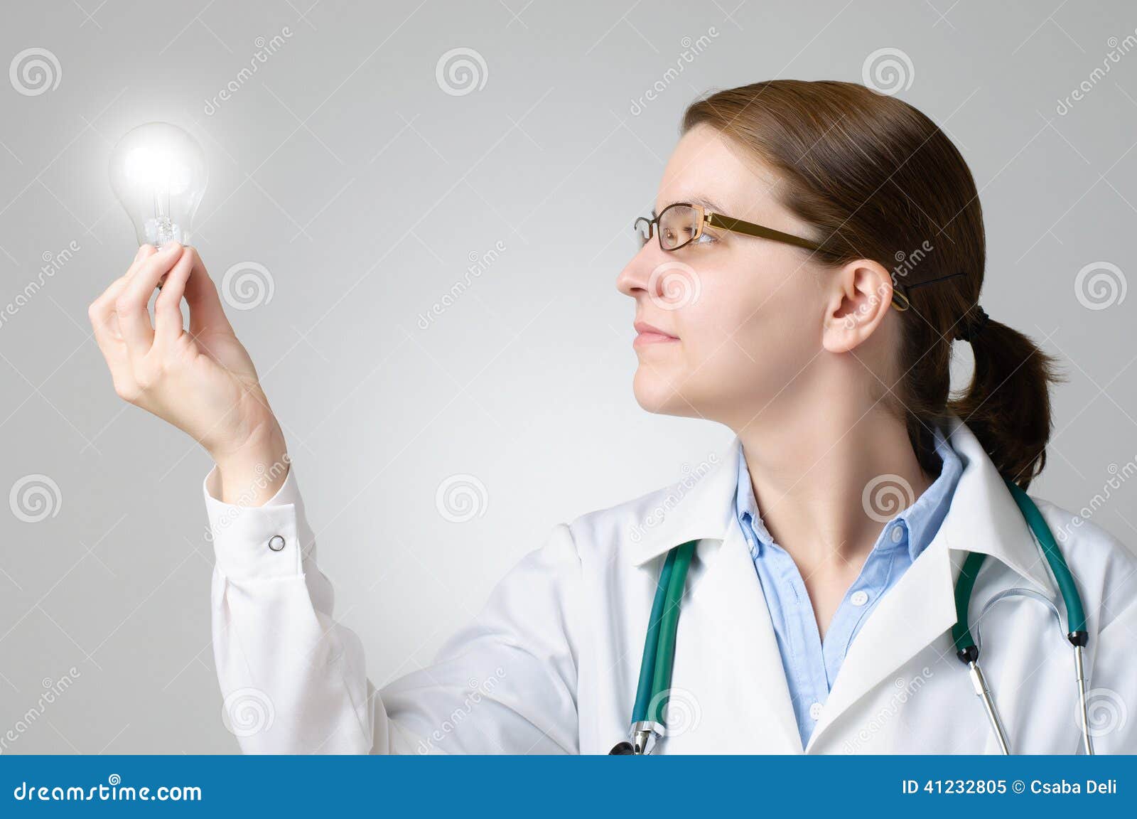 Doctor with Glowing Light Bulb Stock Image - Image of imagination ...