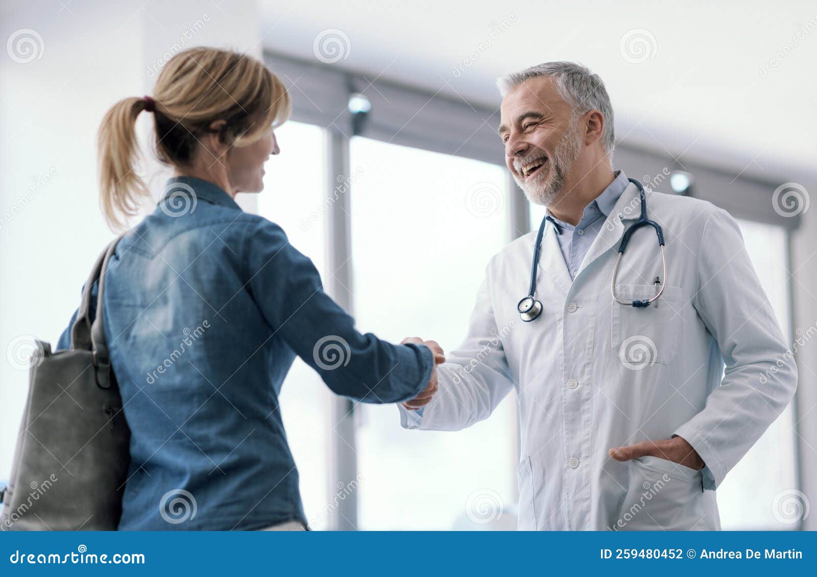 Doctor Greeting a Patient in His Office Stock Photo - Image of cheerful ...