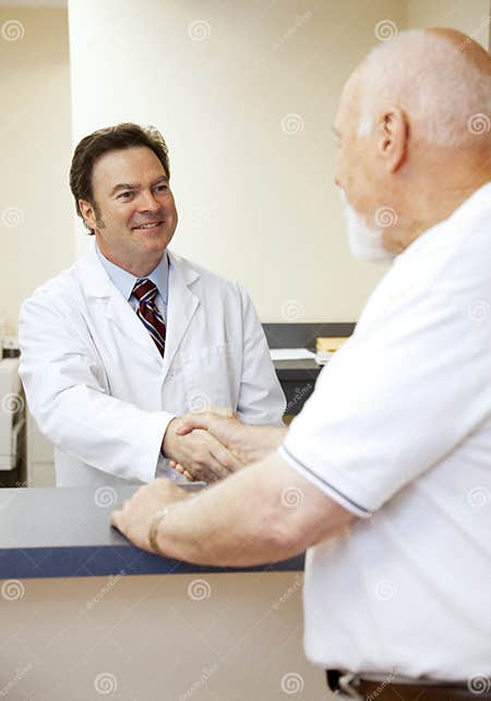 Doctor Greets Patient stock image. Image of meeting, greeting - 13047471