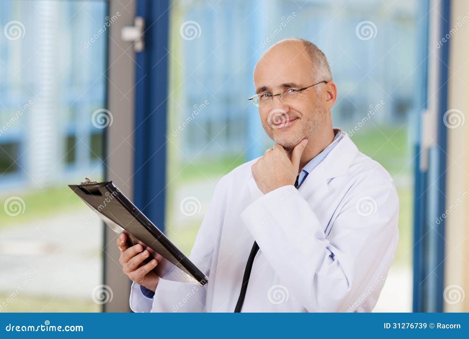 Doctor with Hand on Chin stock image. Image of person - 31276739