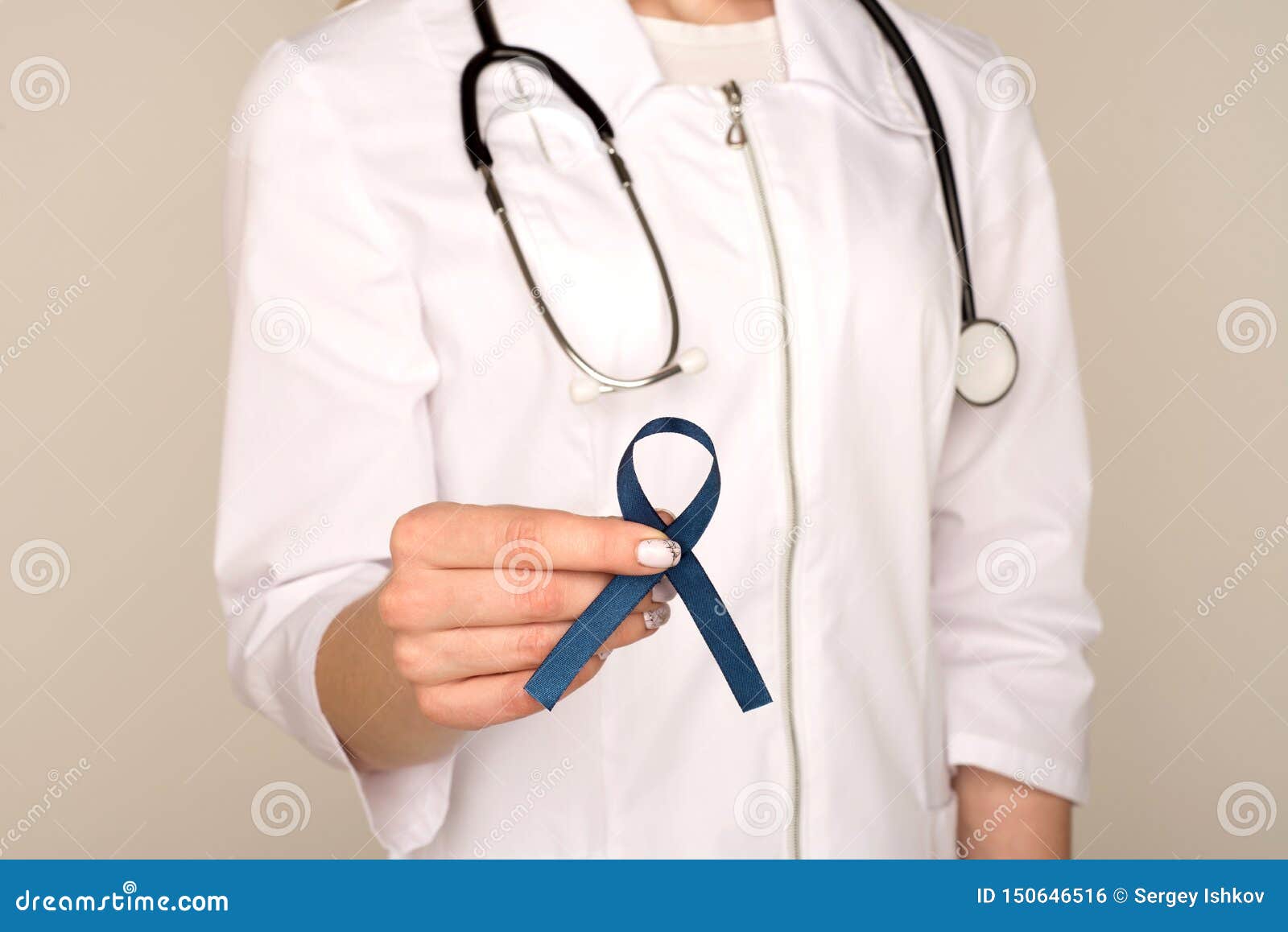 Doctor Hands Holding Blue Ribbon Diabetes And Colorectal Cancer