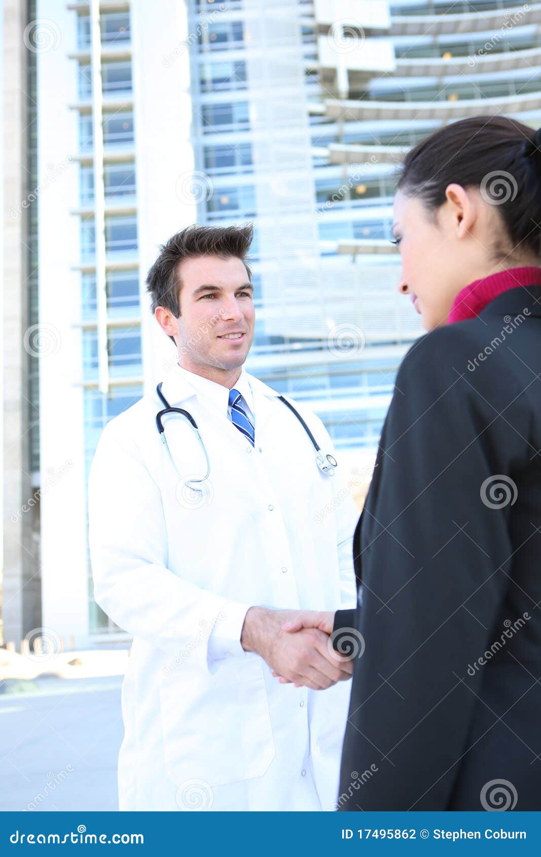 Doctor Handshake with Patient Stock Photo - Image of building, hospital ...