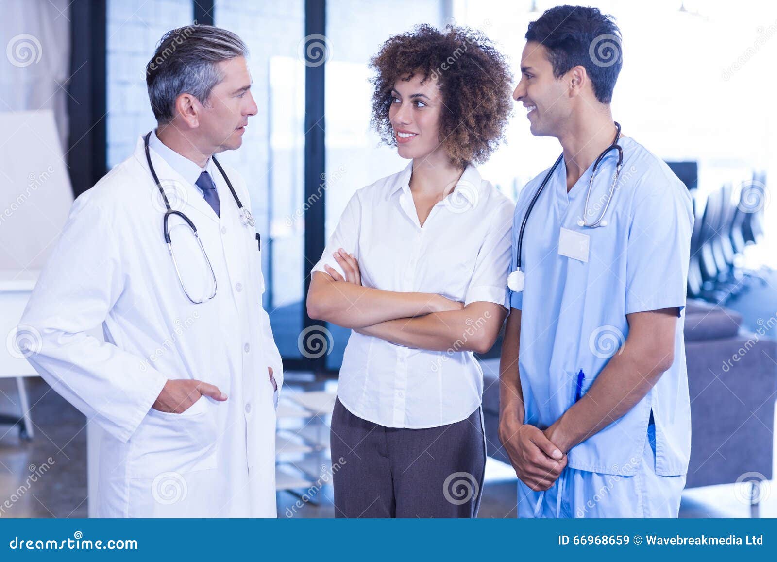 Doctor Having a Discussion with Colleagues Stock Image - Image of ...