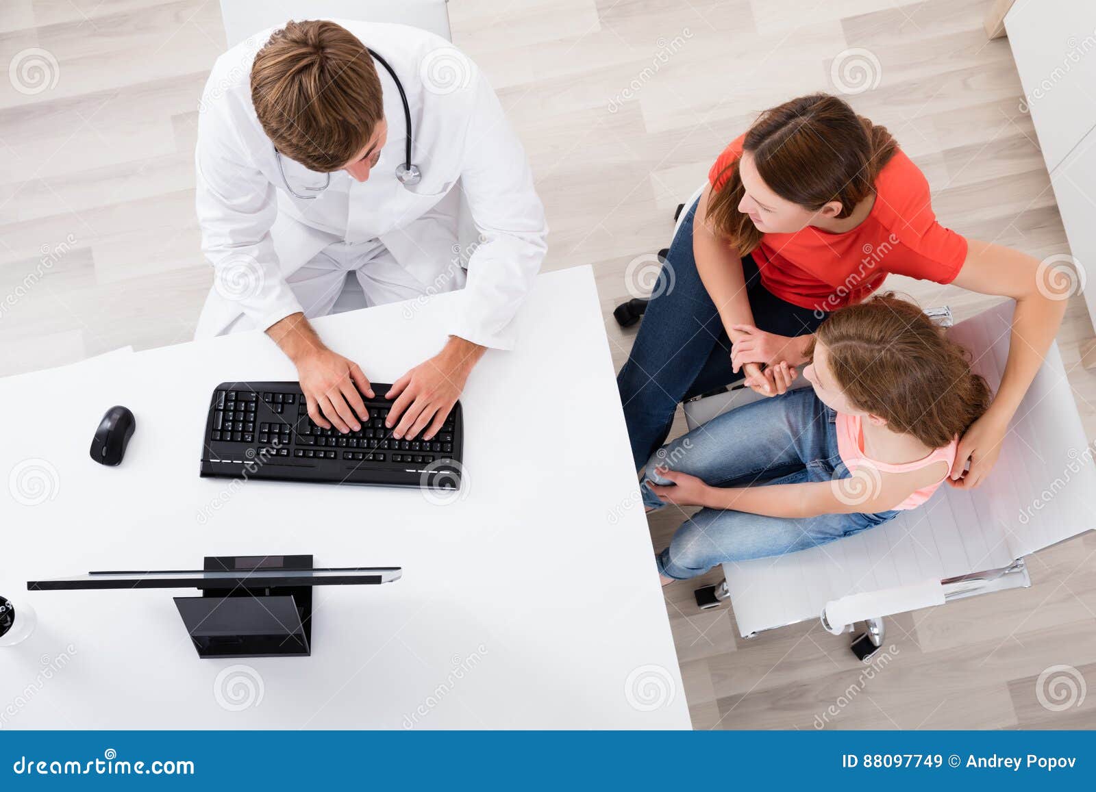 Doctor Having Discussion with Patient in Clinic Stock Image - Image of ...