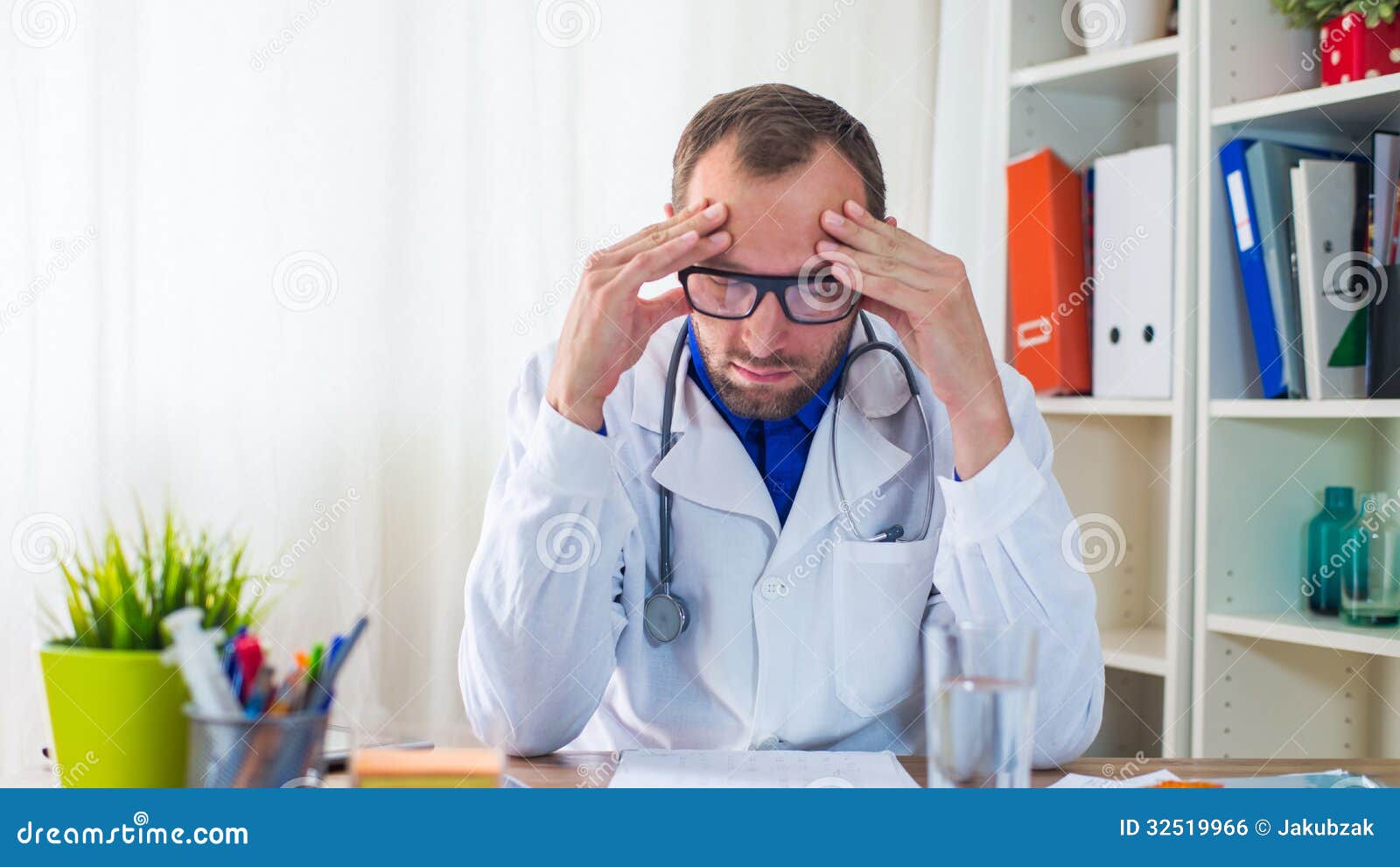 Doctor having a headache. stock photo. Image of person - 32519966