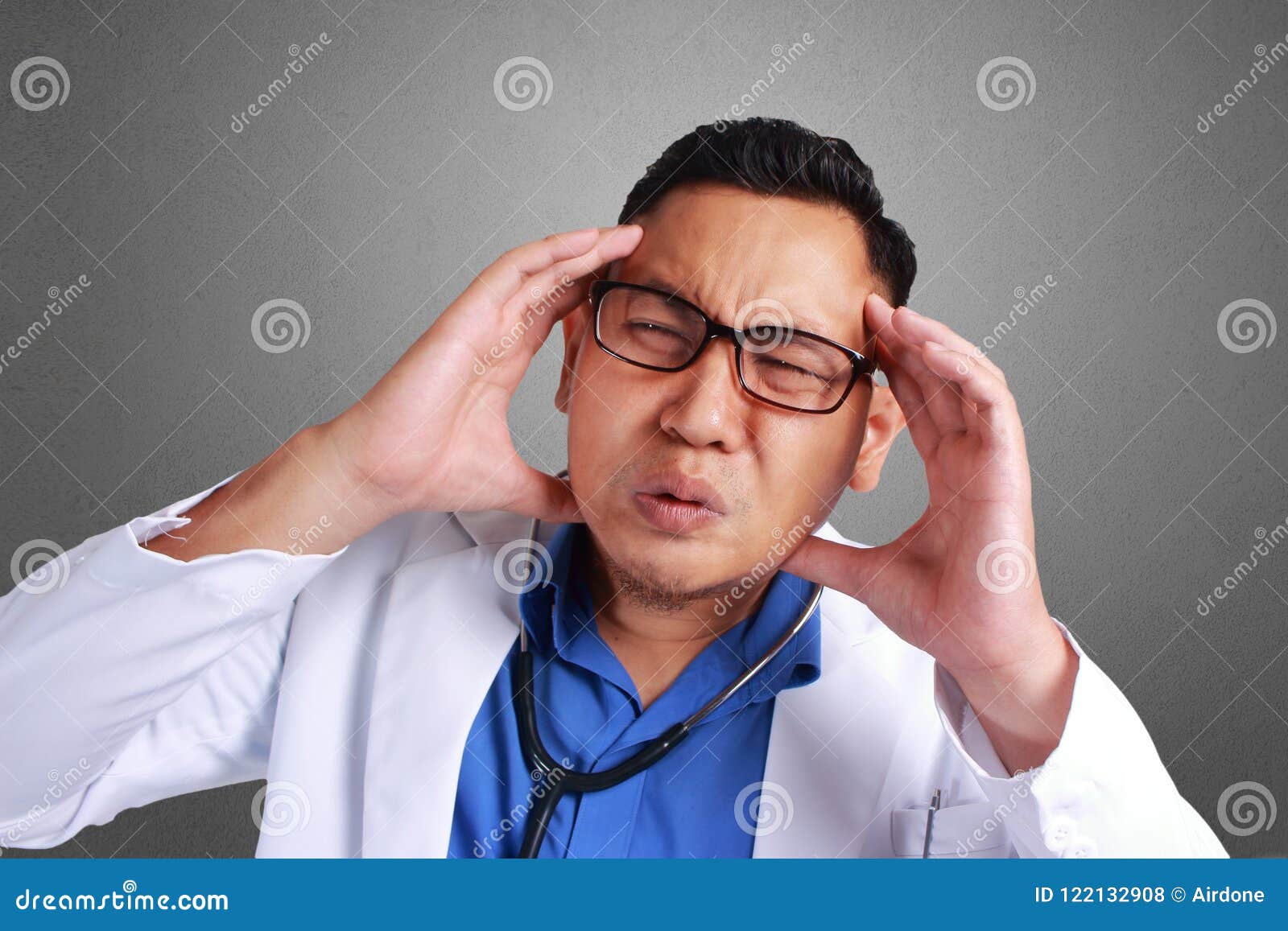 Doctor Having Headache stock photo. Image of negativity - 122132908