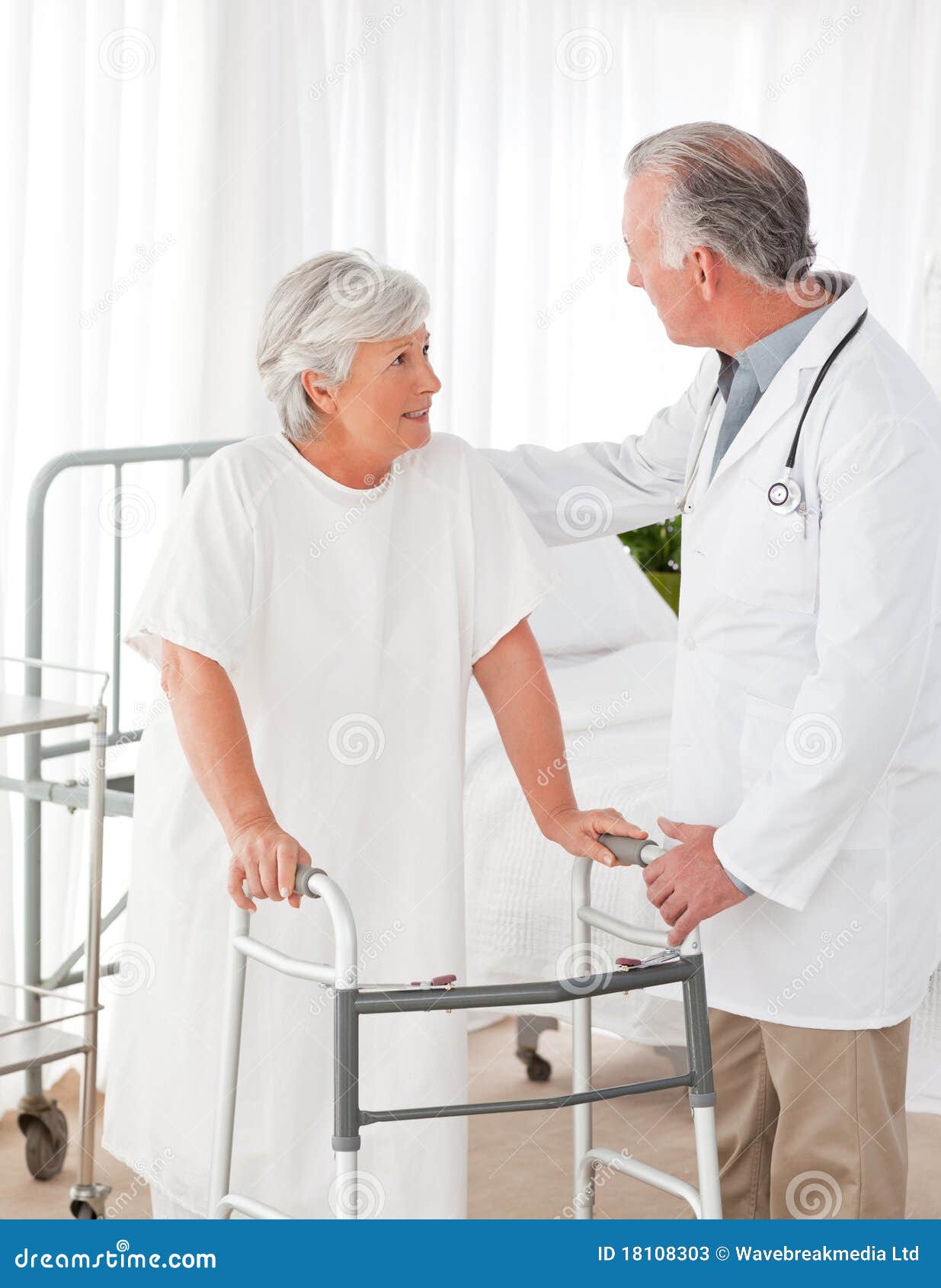 Doctor Helping His Patient To Walk Stock Image - Image of room ...