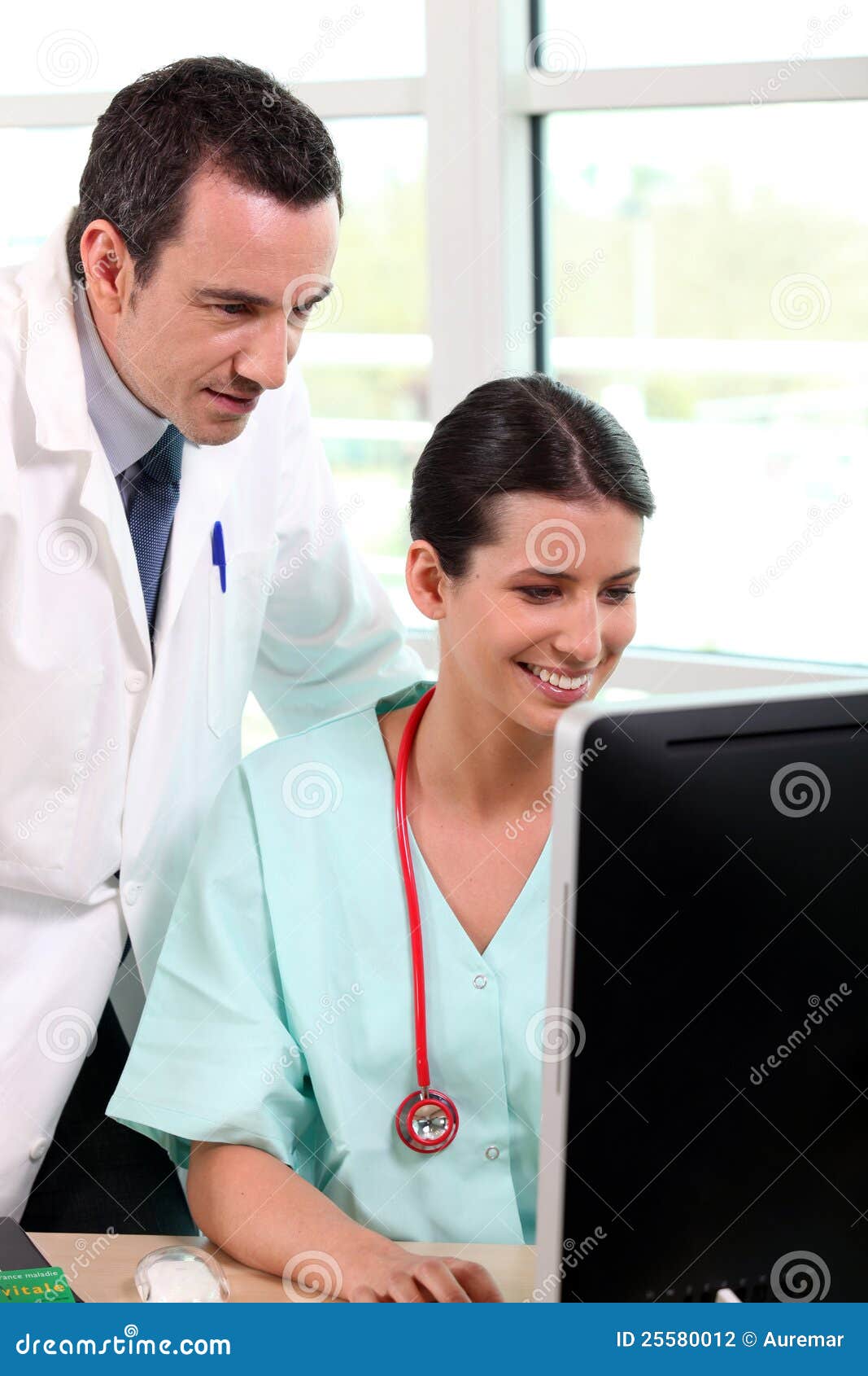 Doctor with his assistant stock photo. Image of medicine - 25580012