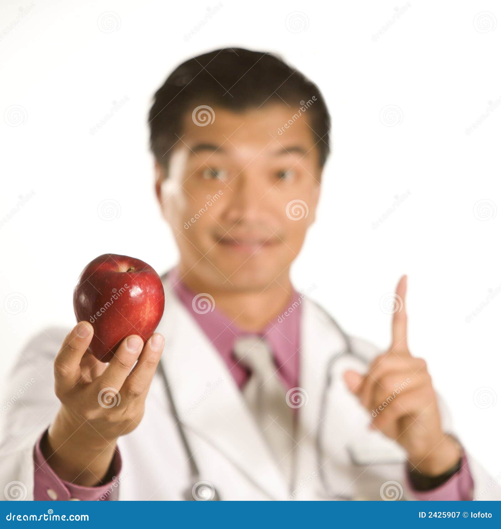 Doctor holding apple. stock image. Image of medical, illness - 2425907