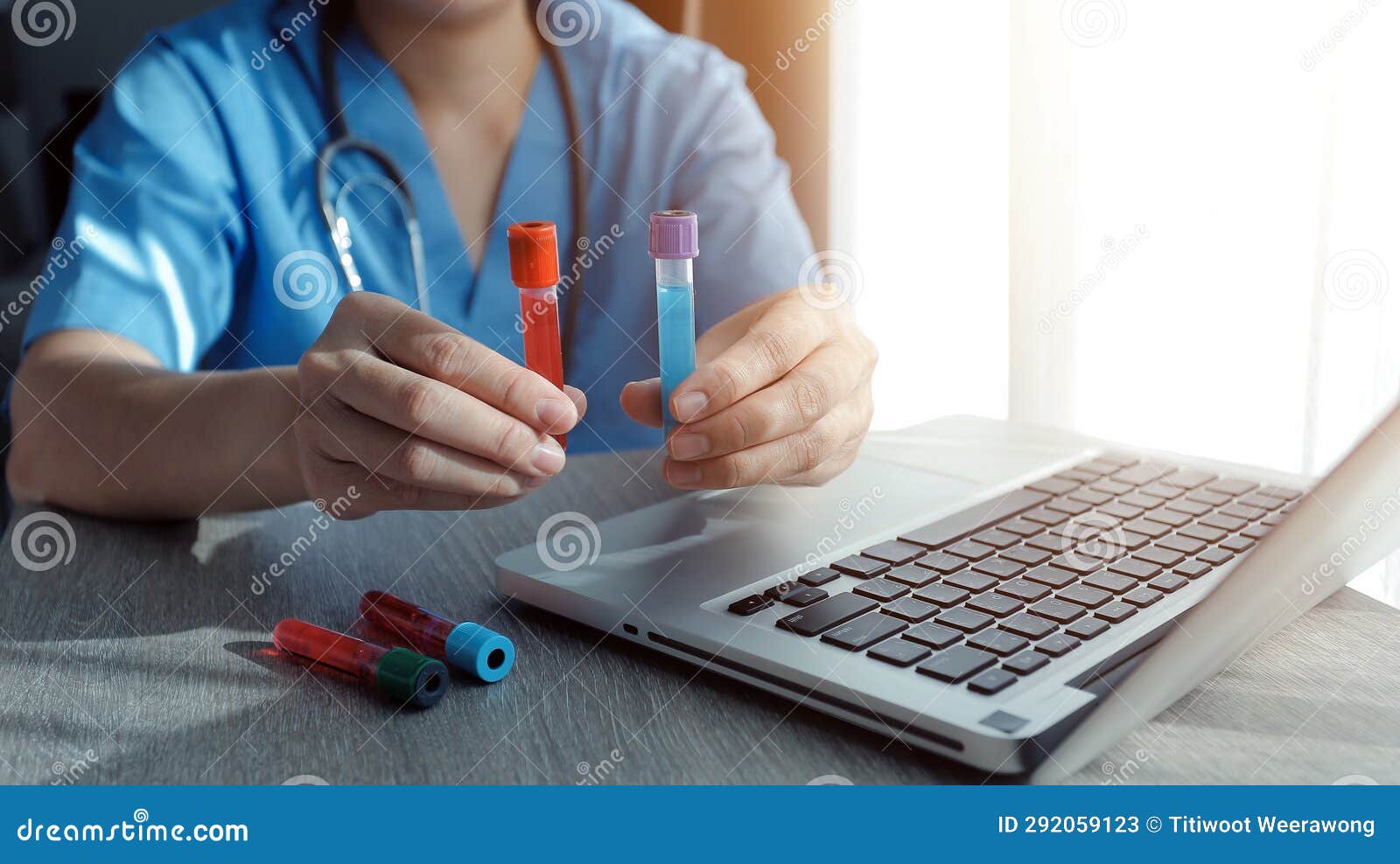Doctor Holding Blood Vessels for Analysis and Checking Blood in ...