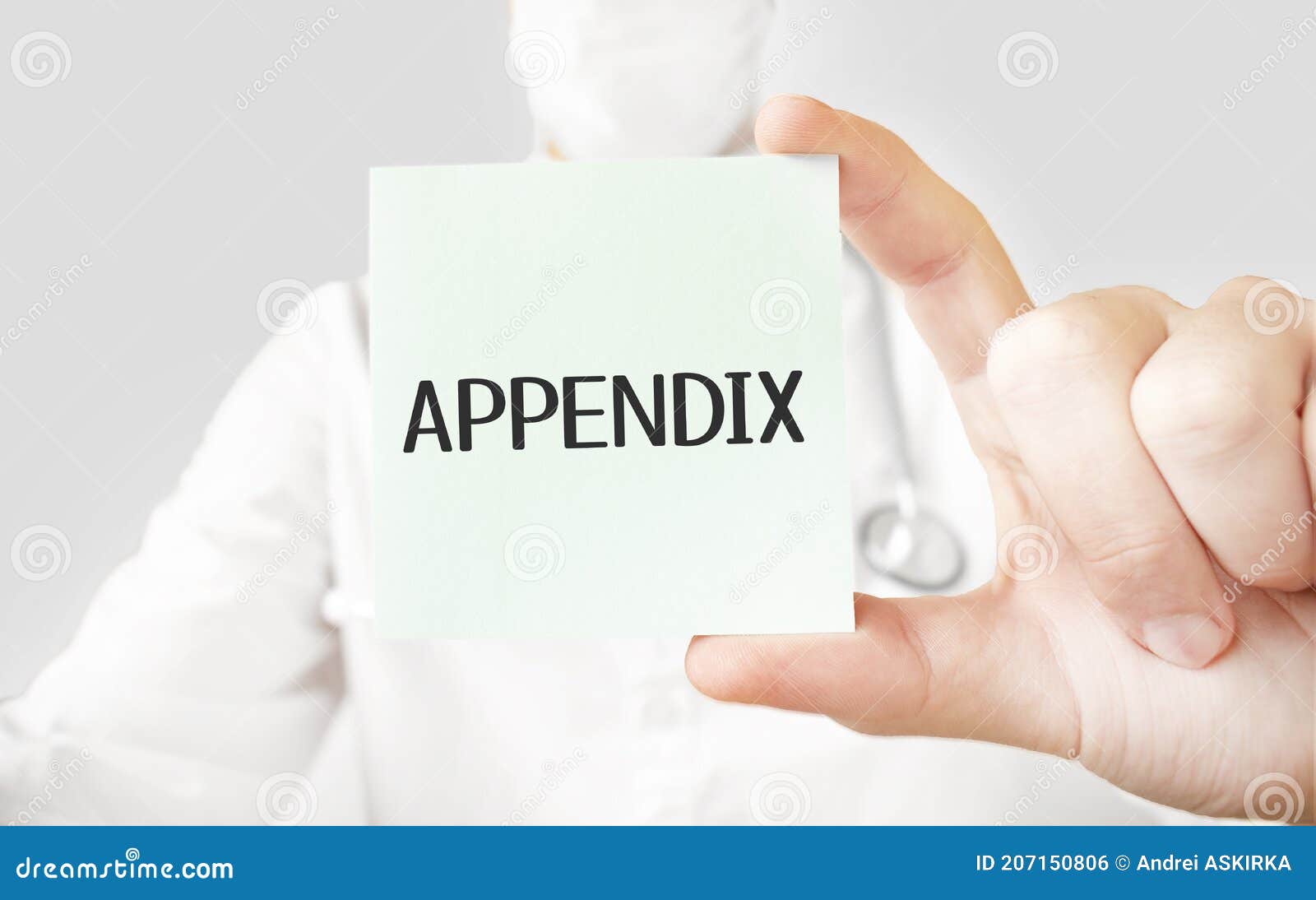 Doctor Holding Card in Hands and Pointing the Word APPENDIX Stock Photo ...