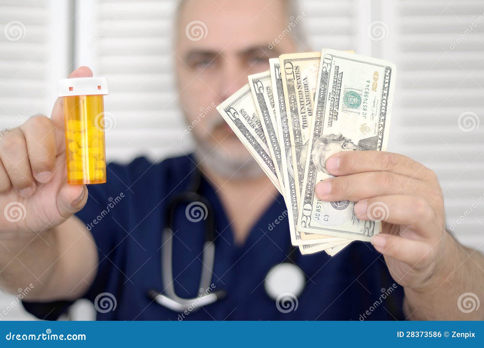 Doctor Holding Cash and Pills Stock Photo - Image of dollar, occupation ...