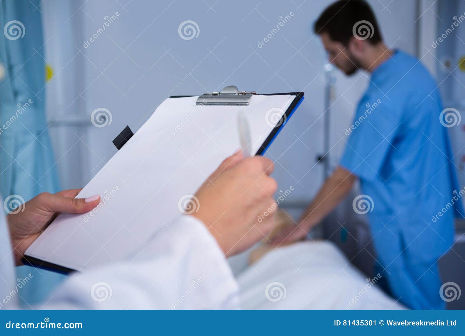 Doctor holding clipboard stock image. Image of clinic - 81435301