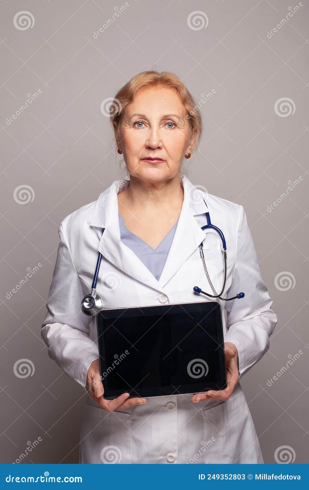 Doctor Holding Digital Tablet and Looking at Camera Stock Image - Image ...
