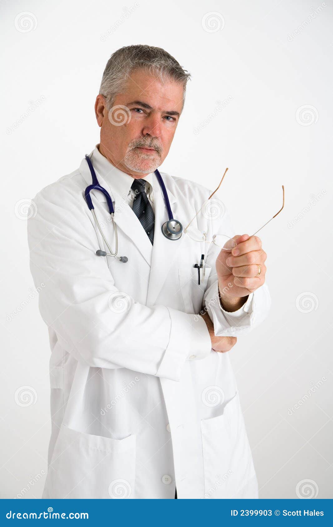Doctor Holding Eyeglasses II Stock Image - Image of friendly, smiling ...
