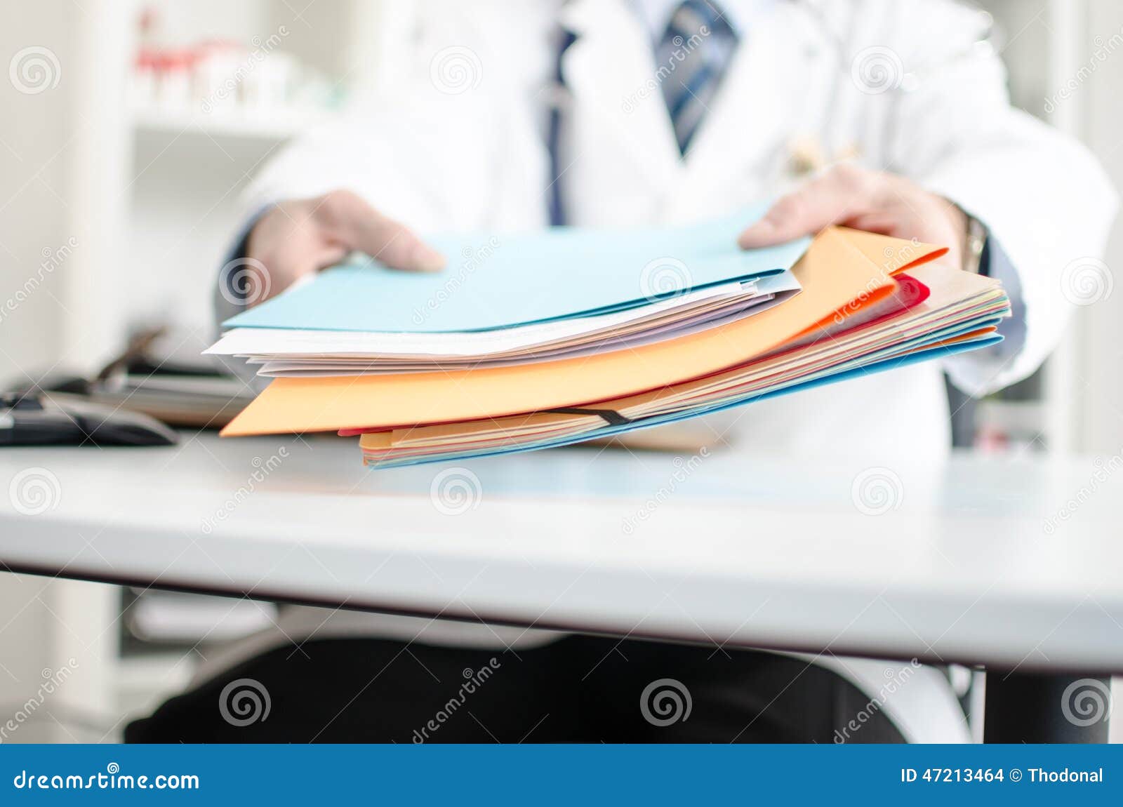 Doctor holding files stock photo. Image of medicine, healthcare - 47213464