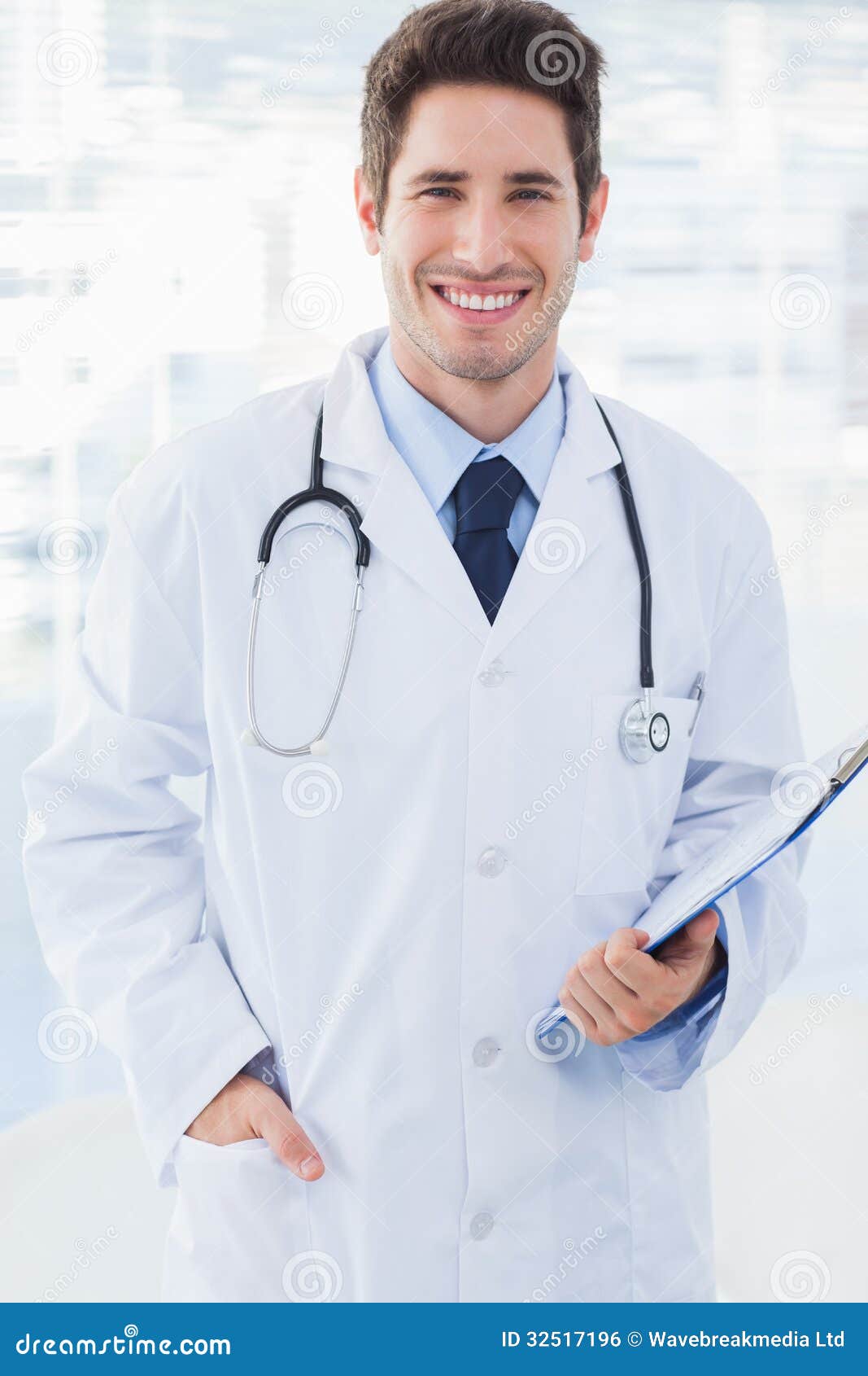Doctor Holding Files and Smiling at Camera Stock Photo - Image of ...