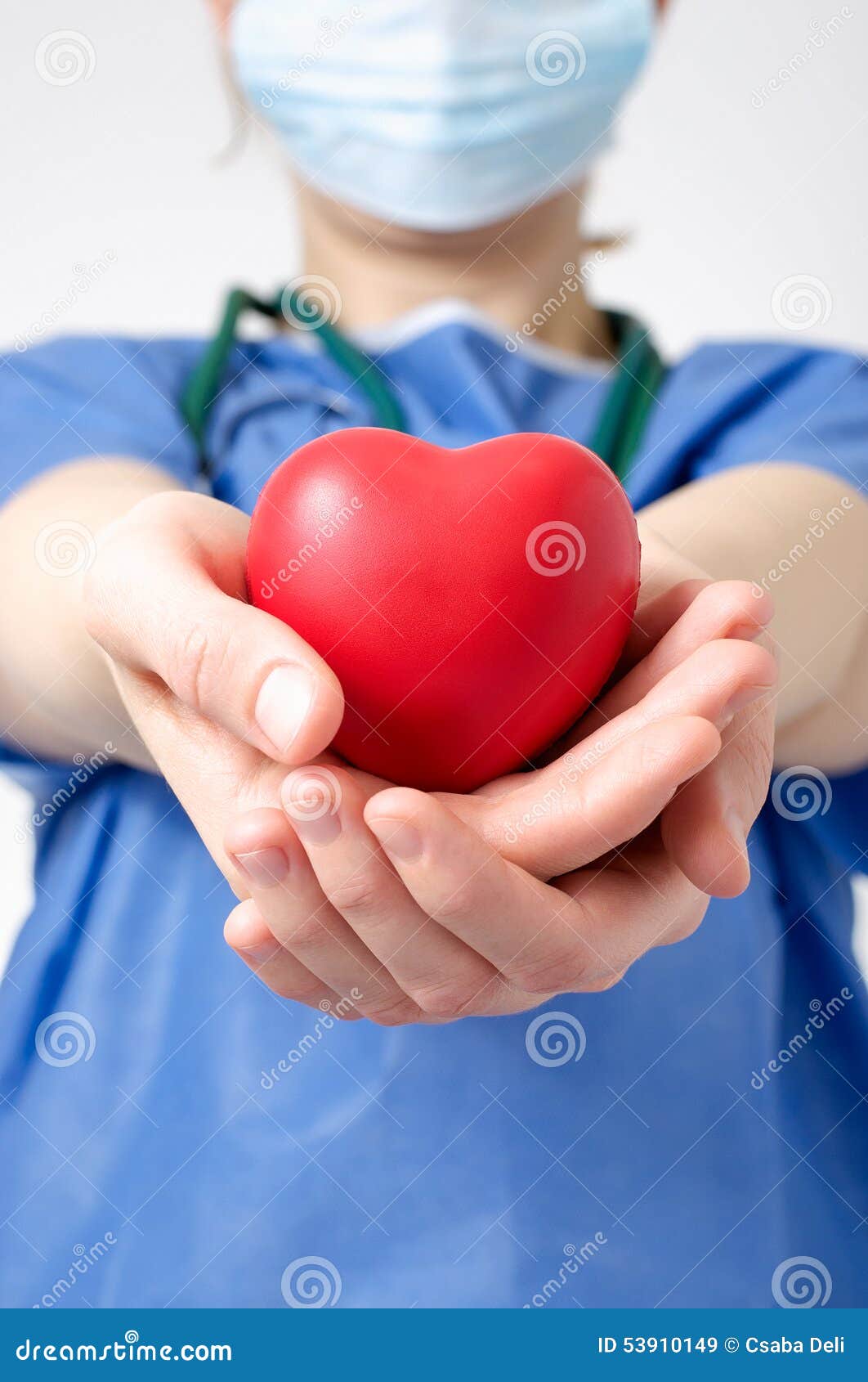 Doctor Holding a Heart Shape Stock Image - Image of health, covered ...