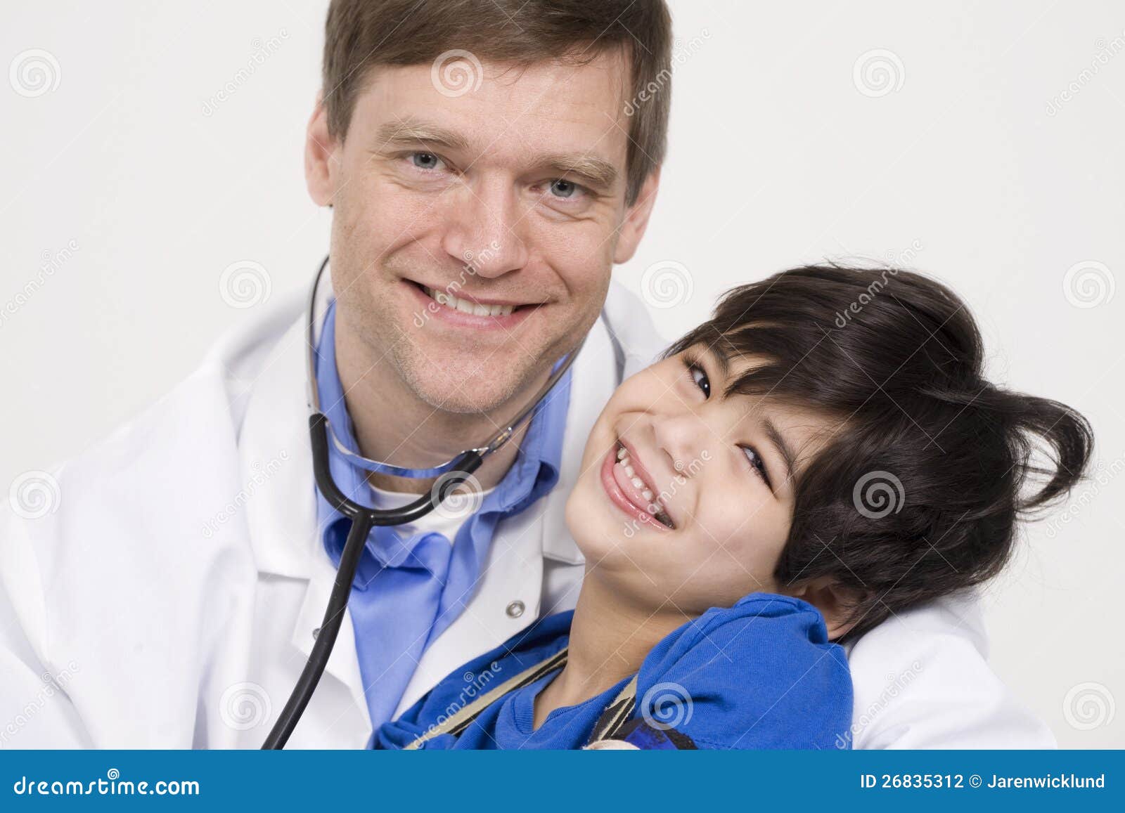 Doctor Holding Little Patient in Arms Stock Photo - Image of holding ...