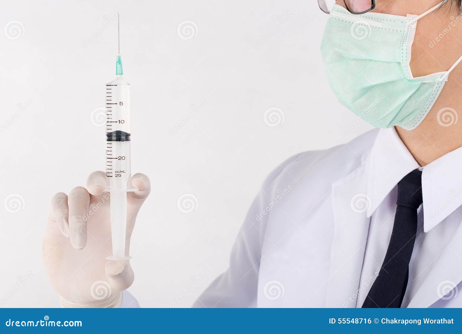 Doctor Holding Medical Injection Syringe with Saline Solution. Stock ...