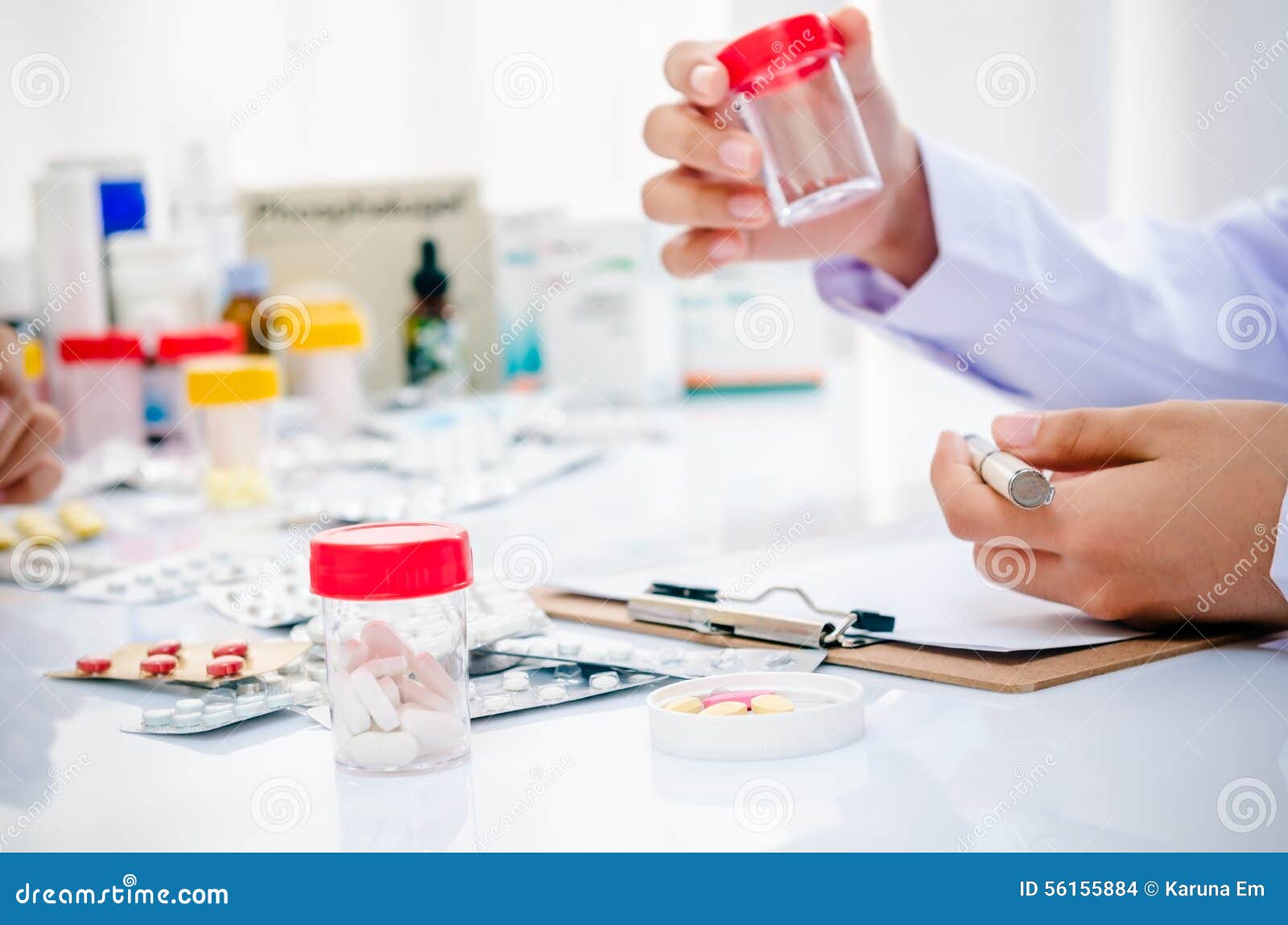 Doctor Holding a Medicine Container Stock Photo - Image of pharmacy ...