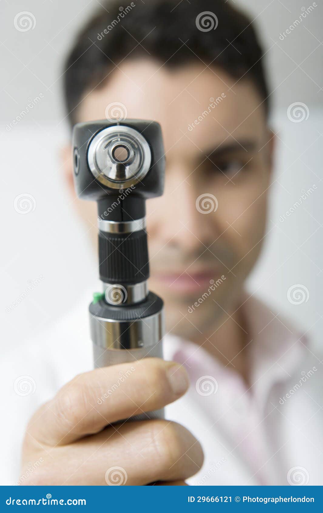 Doctor Holding Otoscope stock image. Image of magnifier - 29666121