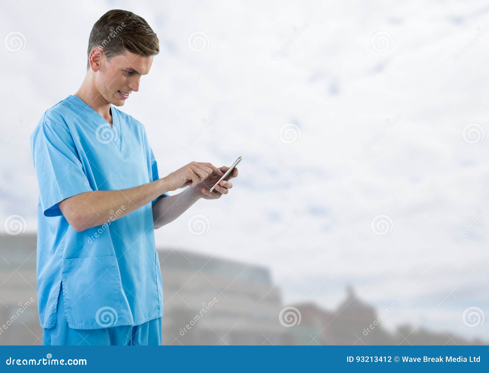 Doctor Holding Phone with Bright Outside Background Stock Photo - Image ...